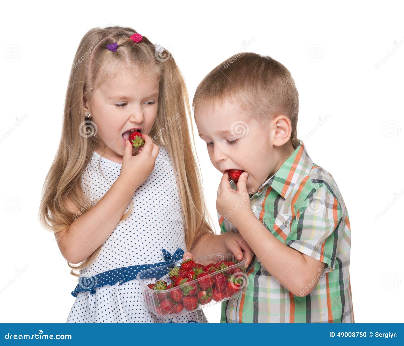 Children eat strawberry stock photo. Image of little - 49008750