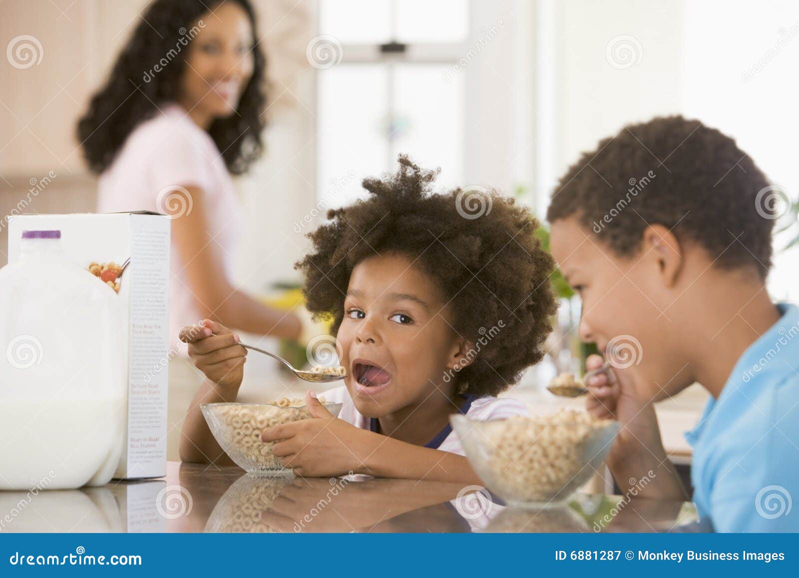 Children Eating Breakfast stock image. Image of eating - 6881287