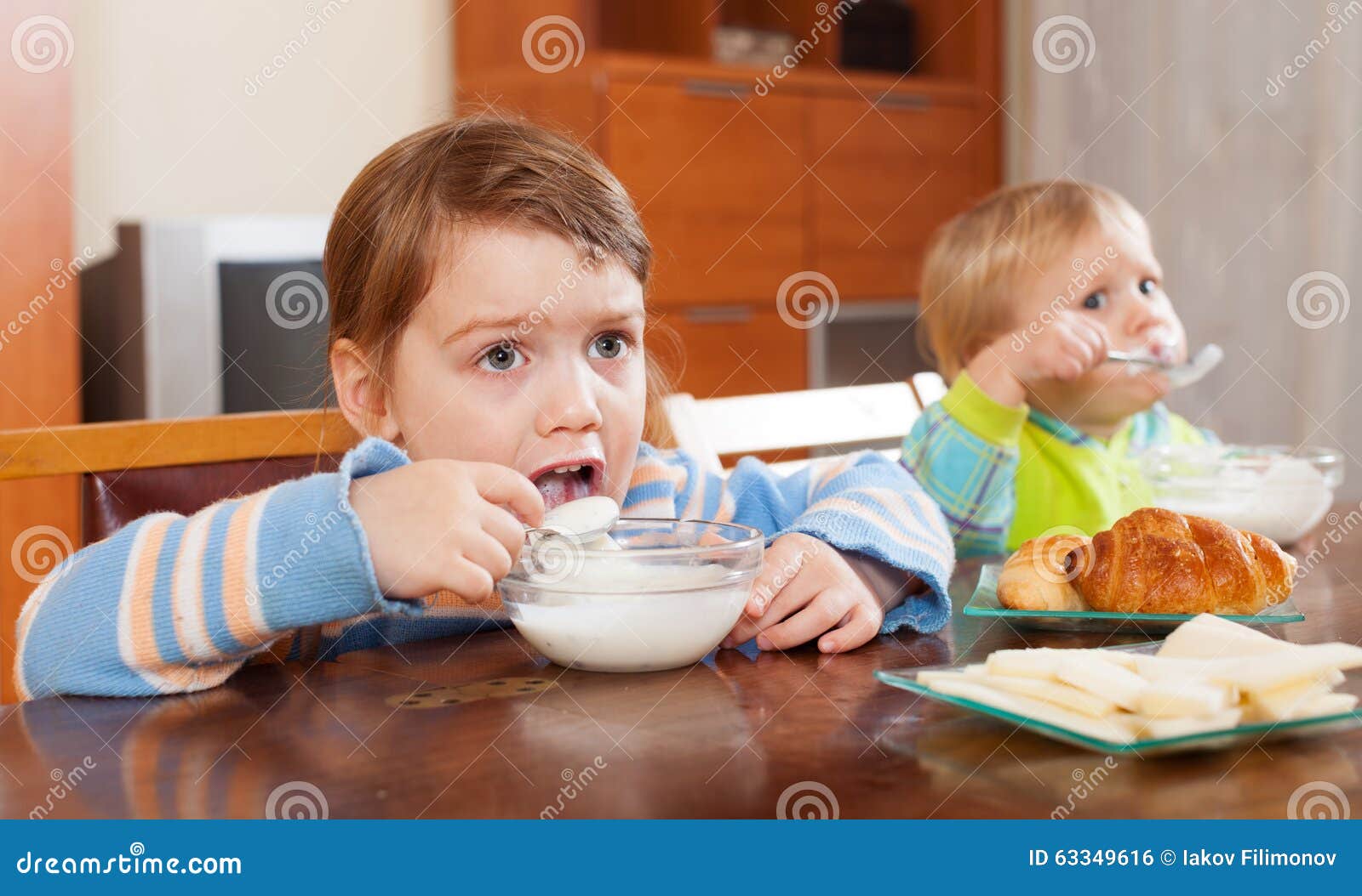 Children Eating Dairy Breakfast Stock Photo - Image of focused ...