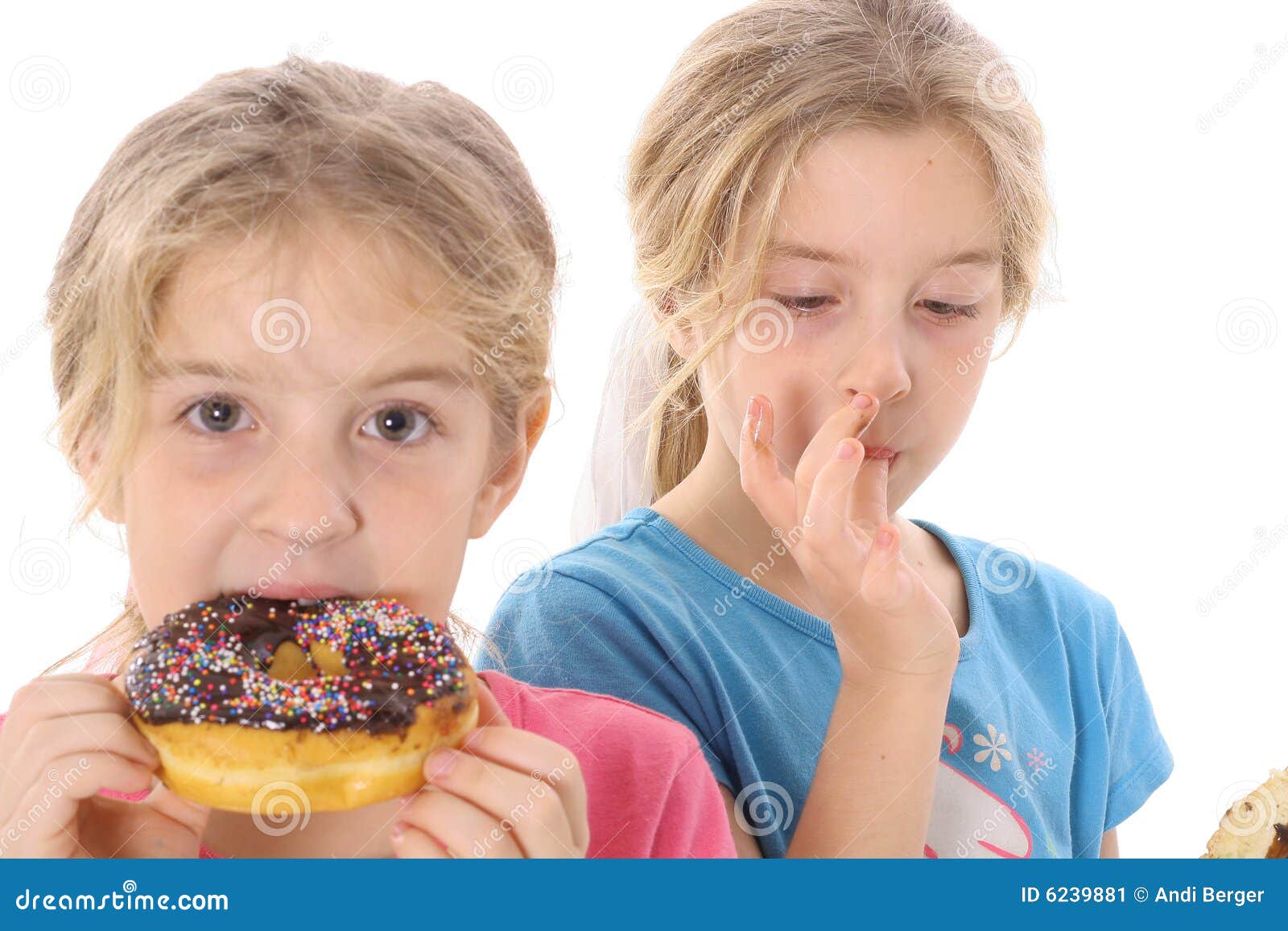 Children eating a doughnut stock image. Image of devour - 6239881