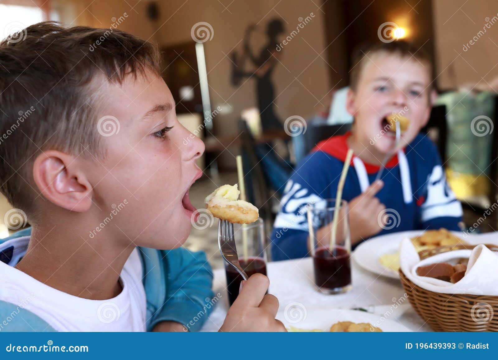 Children eating nuggets stock image. Image of face, diet - 196439393