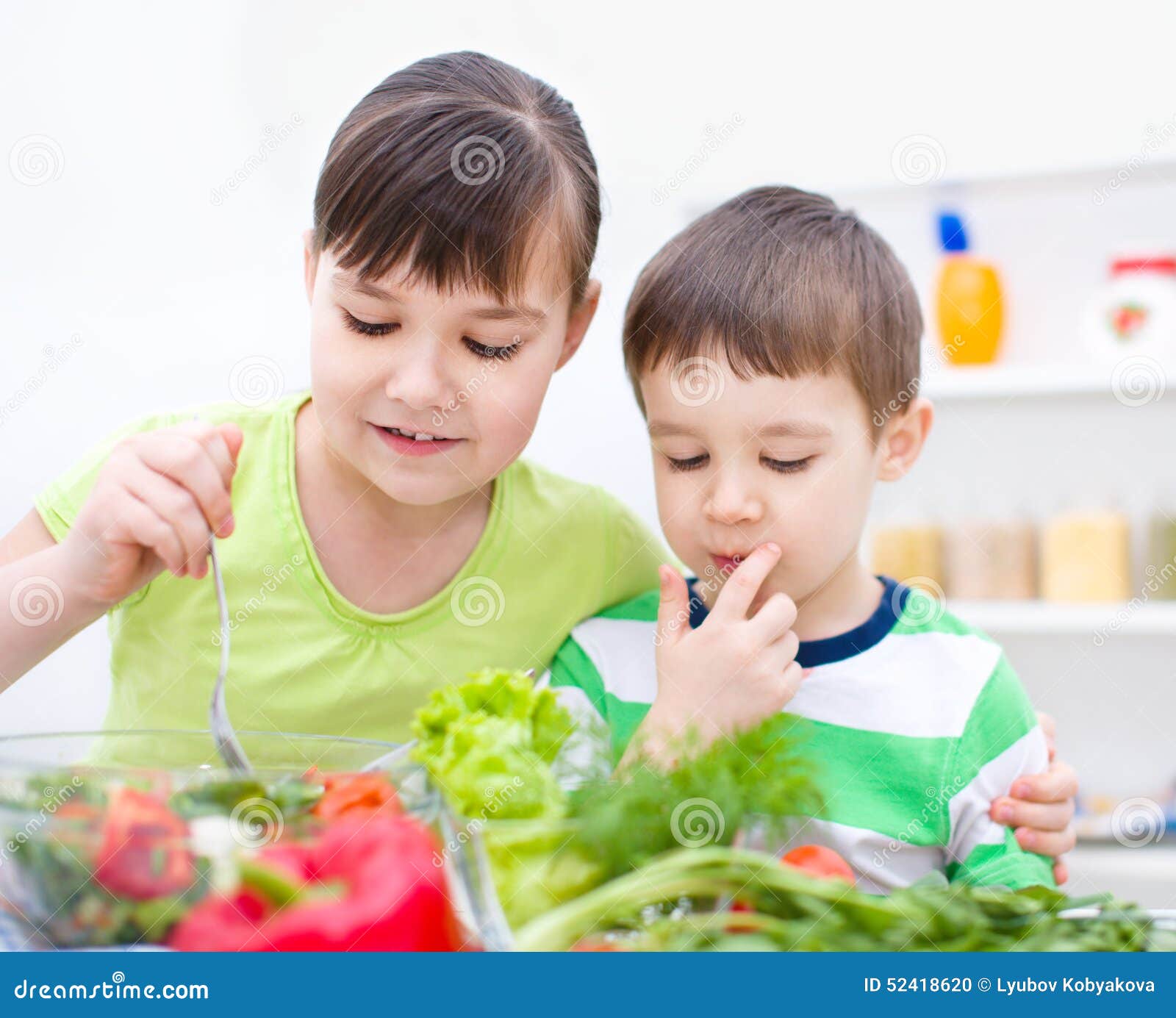 Children eating salad stock photo. Image of nutrition - 52418620