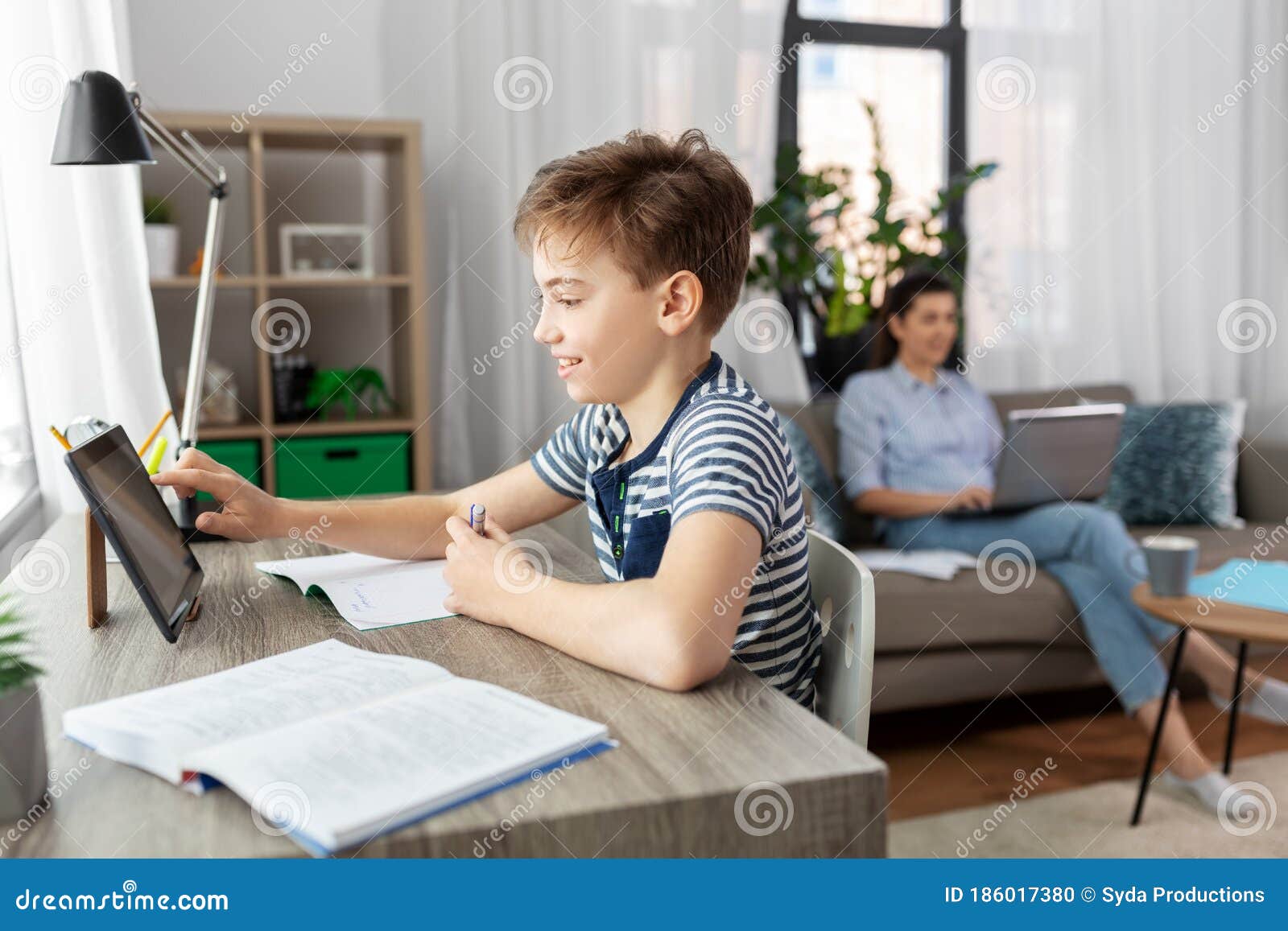 Student Boy with Tablet Computer Learning at Home Stock Photo - Image ...