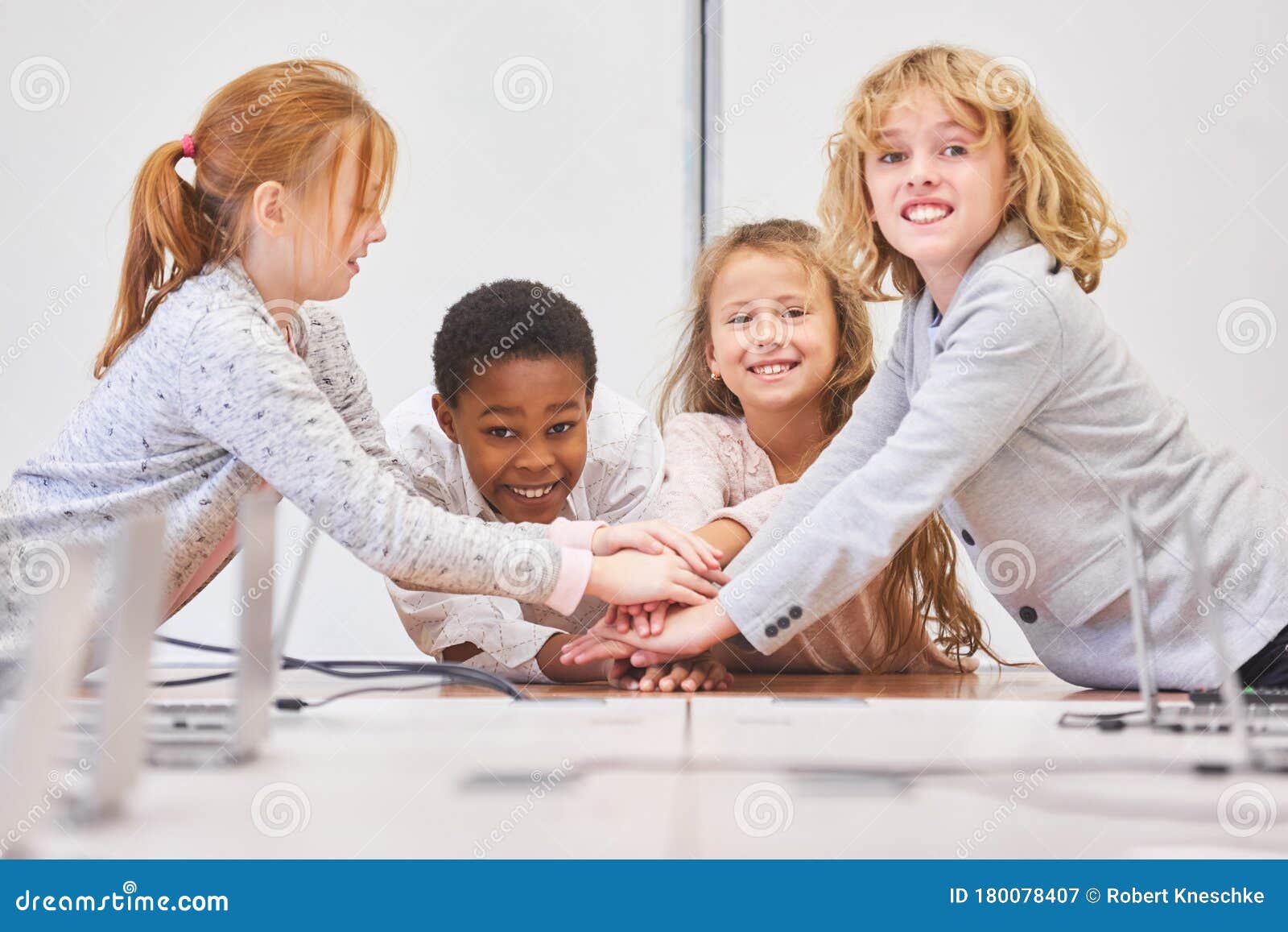 Children in Elementary School are Stacking Hands Stock Image - Image of ...