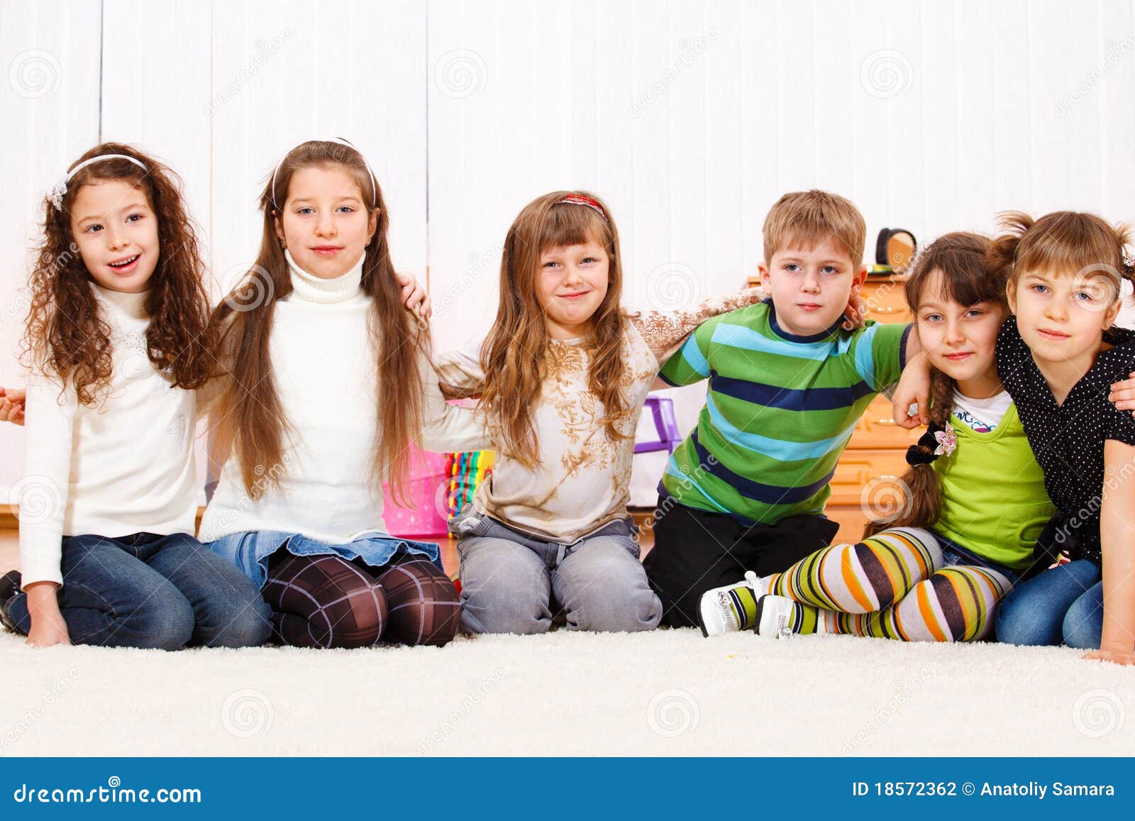 Children embracing stock photo. Image of group, home - 18572362