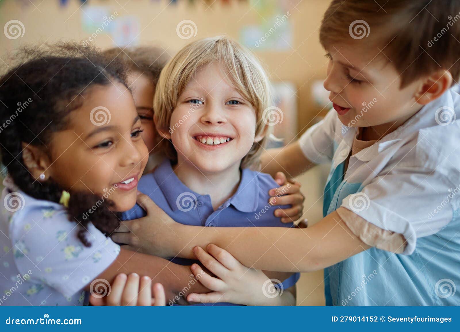 Children Embracing Happily Playing Together Stock Photo - Image of ...
