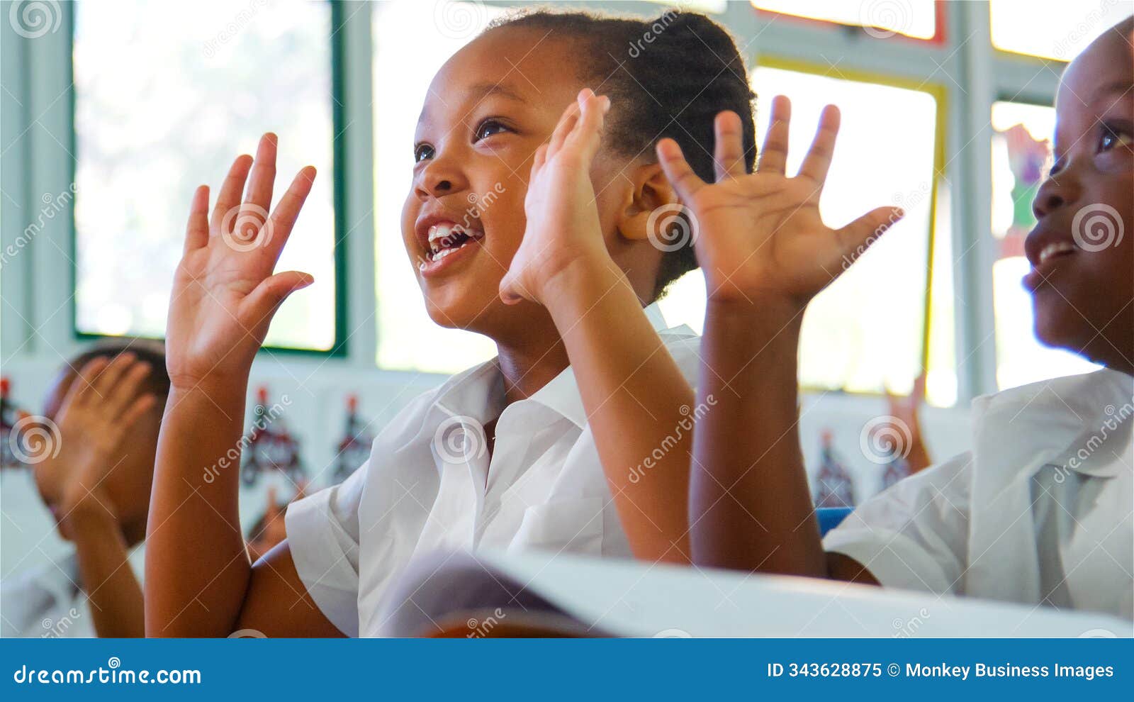 Children Engaged in Learning Activities in a Bright Classroom at School ...