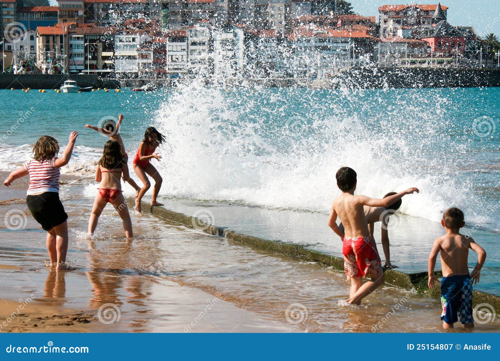 Children Enjoying the Waves Editorial Photography - Image of male ...