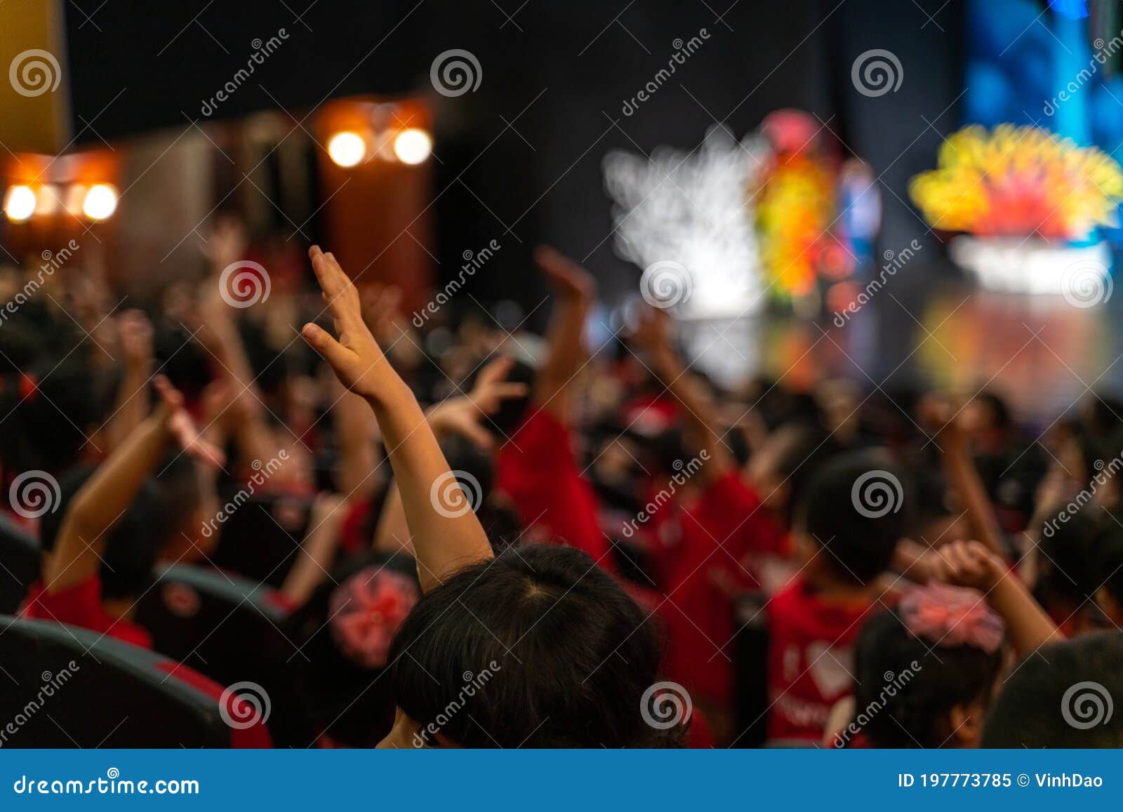 Children Excitingly Raise Hands Watching the Performance in the Theater ...