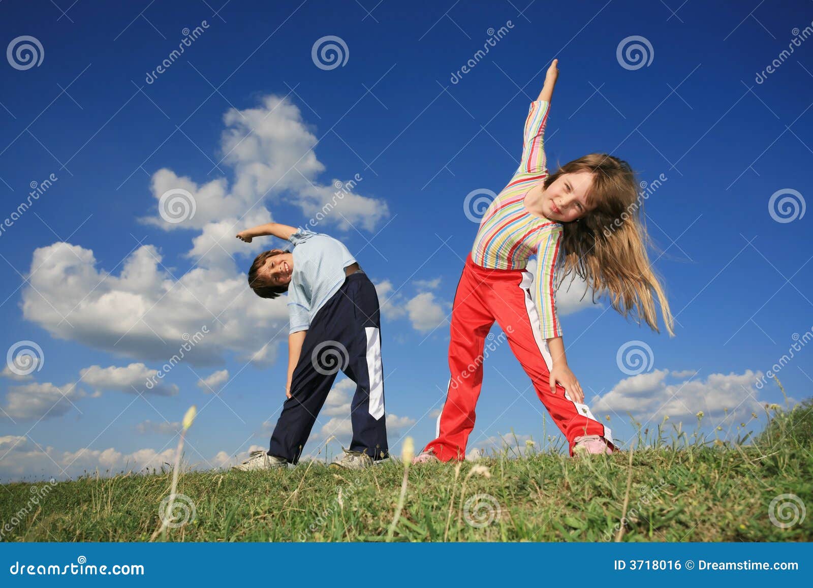 Children Exercising Outdoor Stock Photo - Image of exercise, cloudscape ...