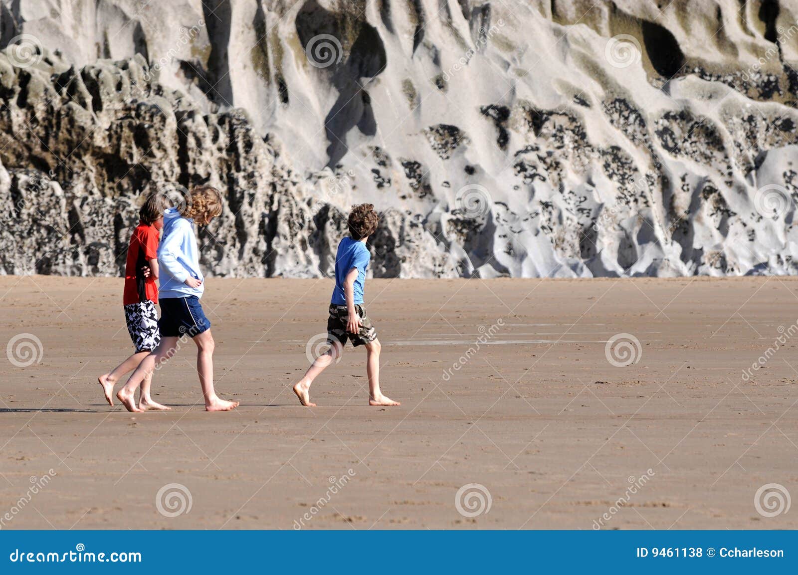 Children exploring beach stock photo. Image of gower, colorful - 9461138