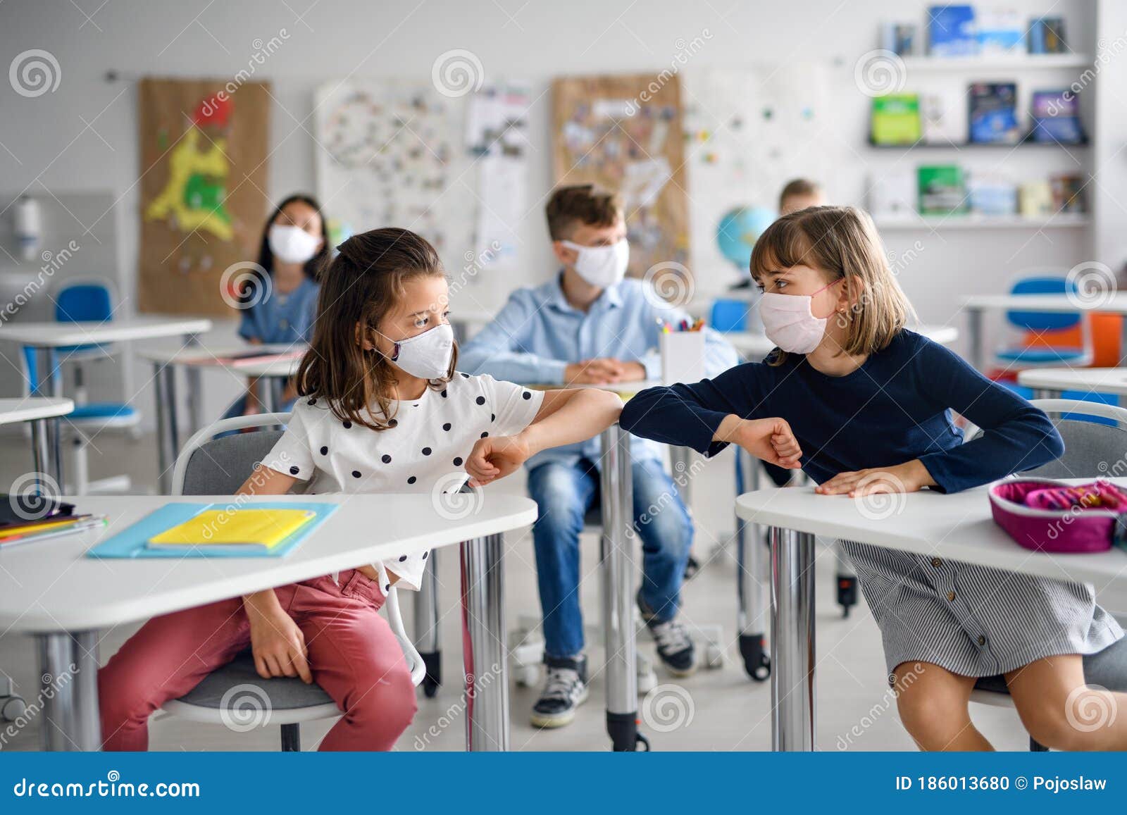 Children with Face Mask Back at School after Covid-19 Quarantine and ...
