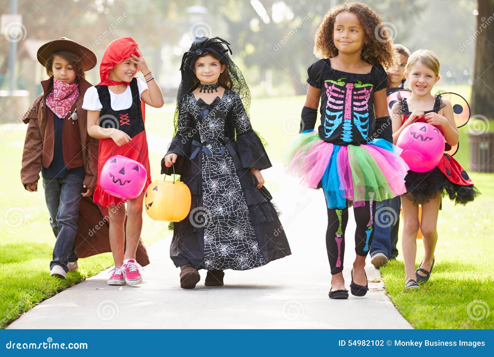 Children in Fancy Costume Dress Going Trick or Treating Stock Photo ...