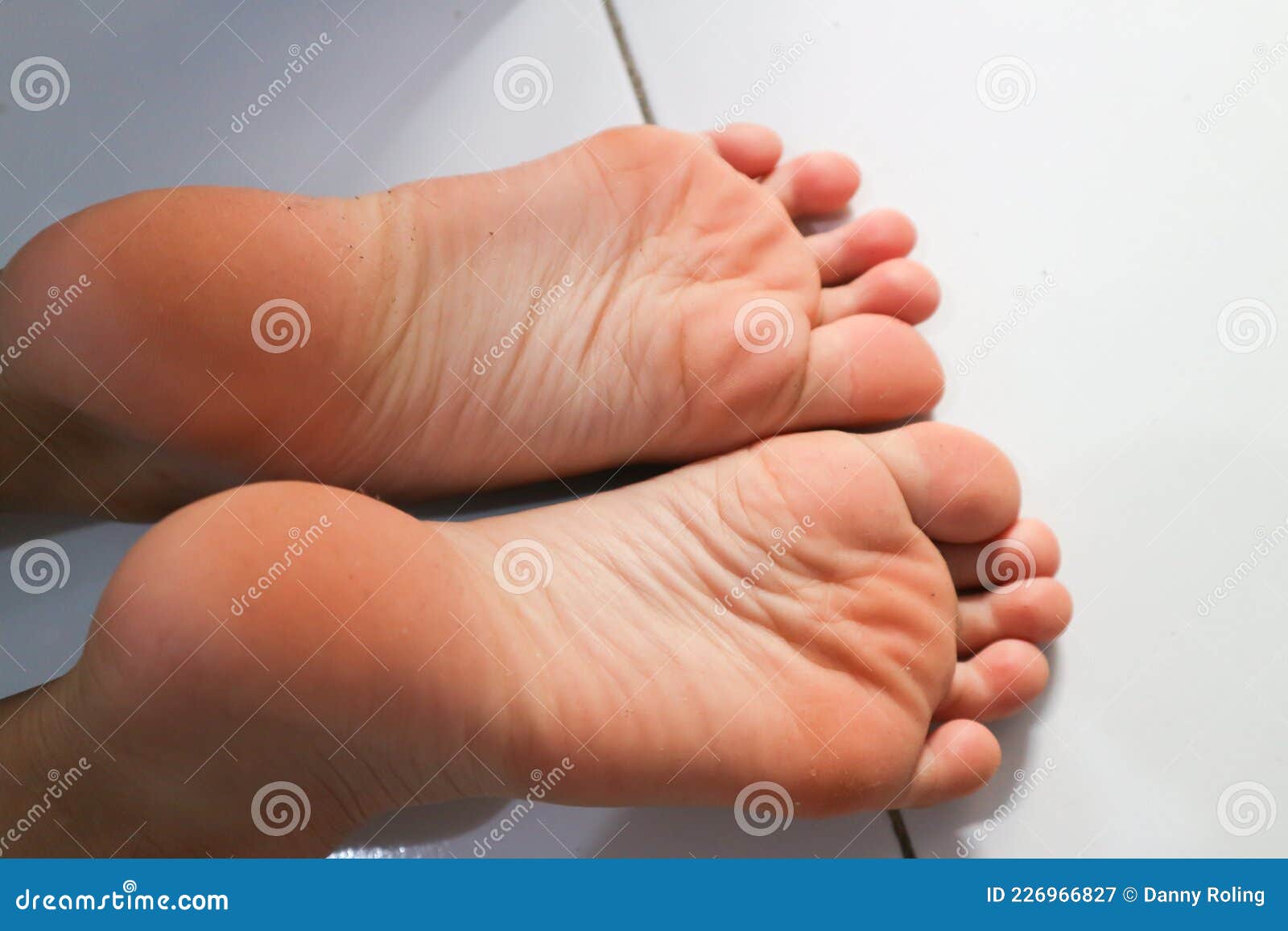 Children feet on the floor stock image. Image of floor - 226966827
