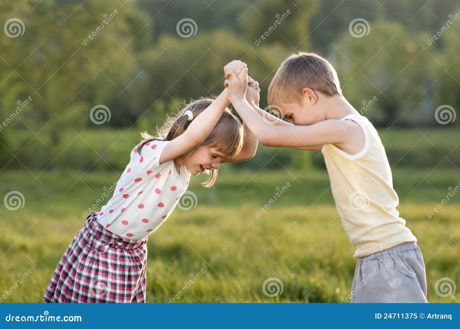 Children fight stock image. Image of summer, playing - 24711375