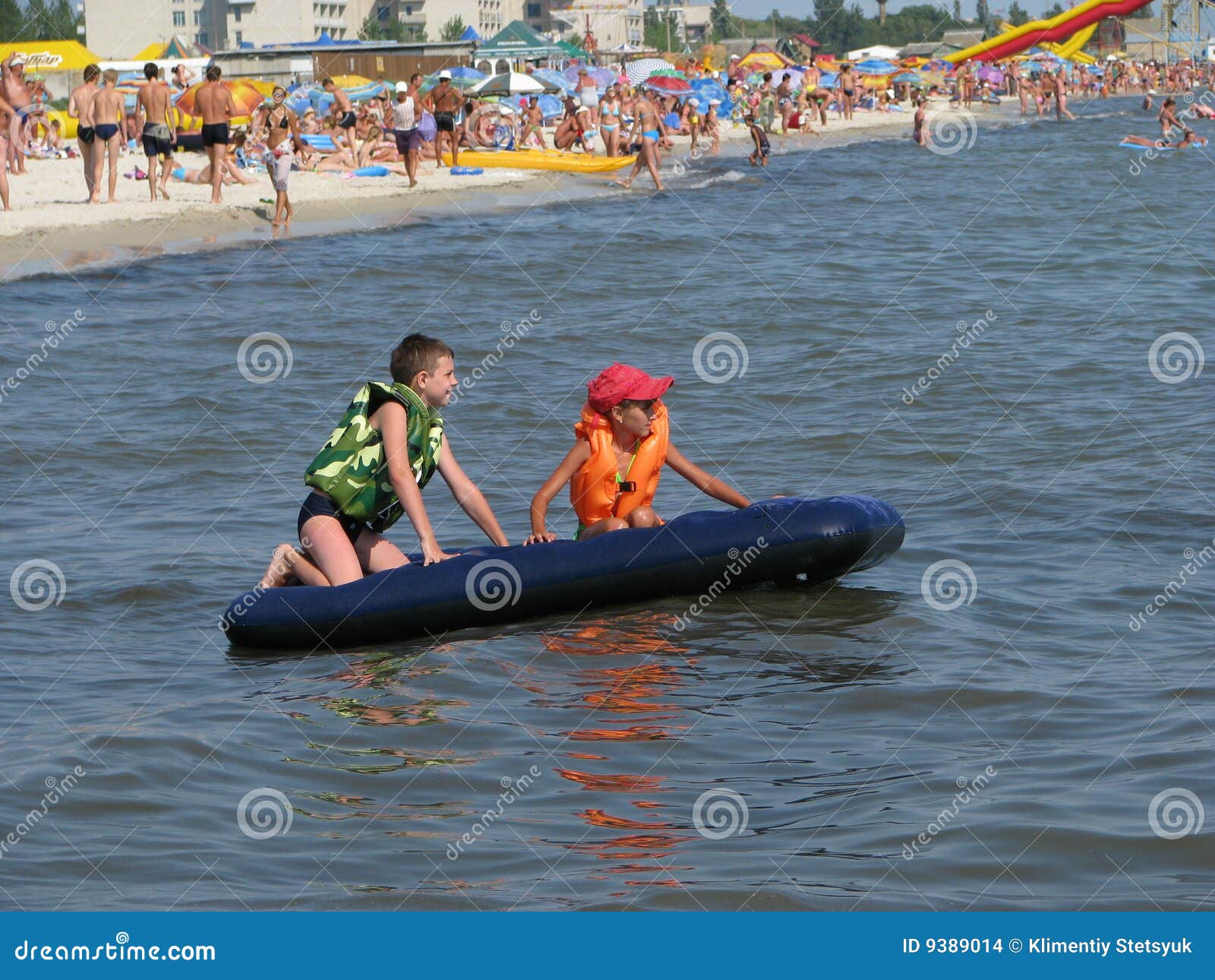 Children Float on an Inflatable Mattress Stock Photo - Image of waves ...