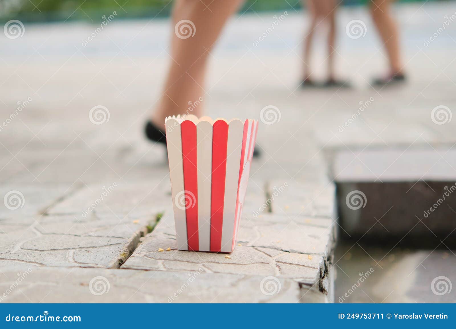 Children Forgot To Throw the Paper Pack from Popcorn in the Trash Bin ...