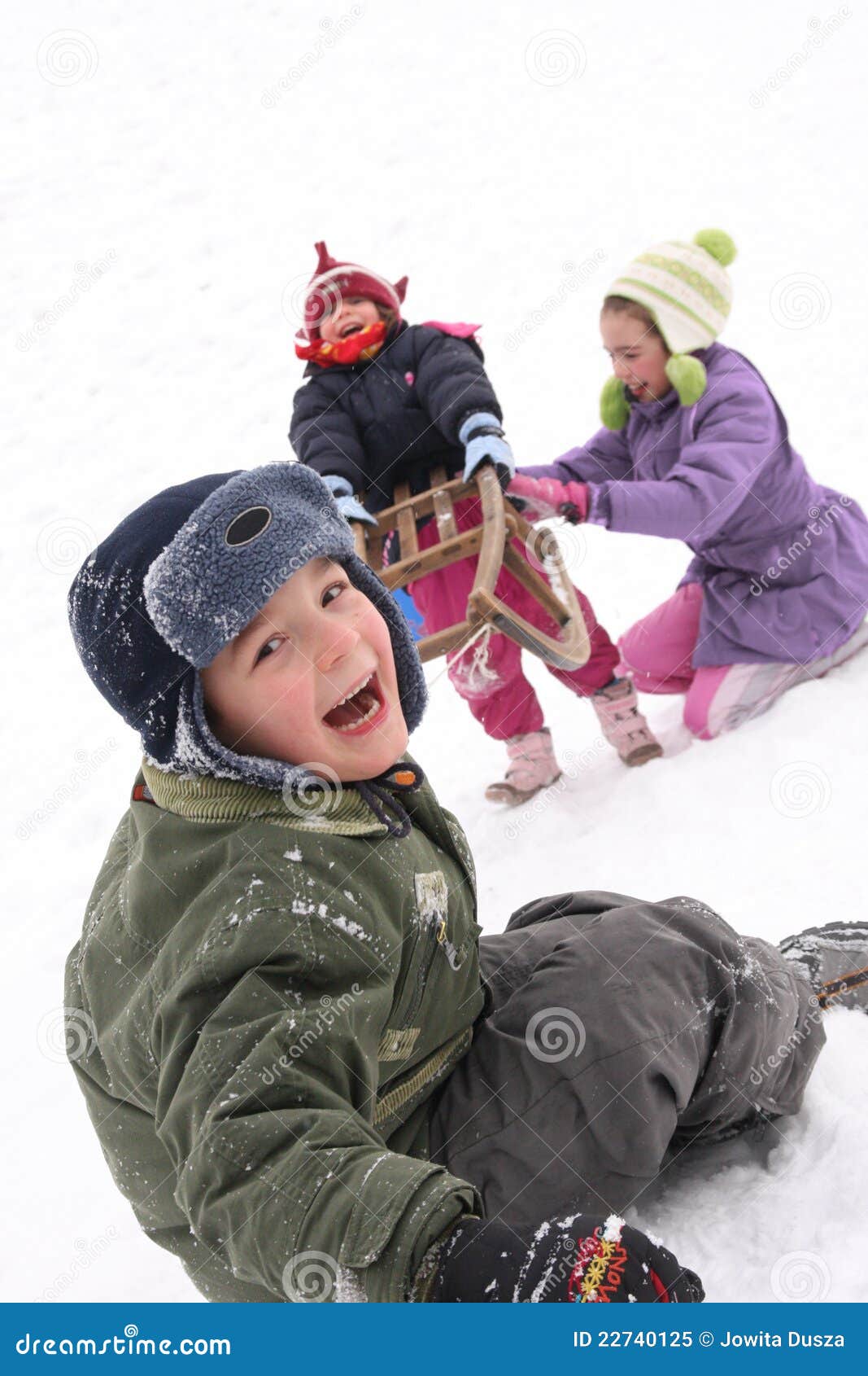 Children fun on the snow stock image. Image of friends - 22740125