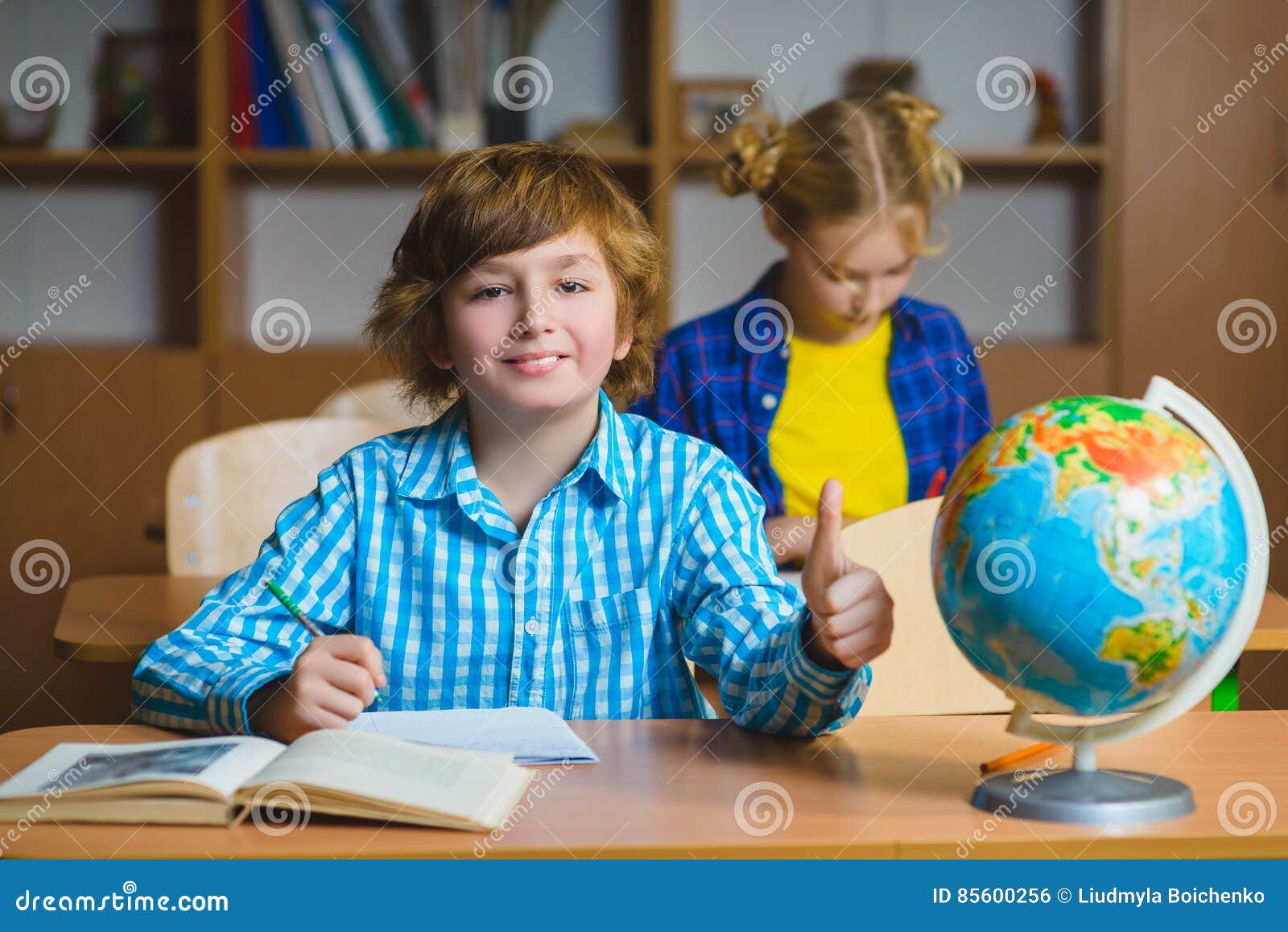 Children on the Geography Lesson in School Classroom. Educational ...
