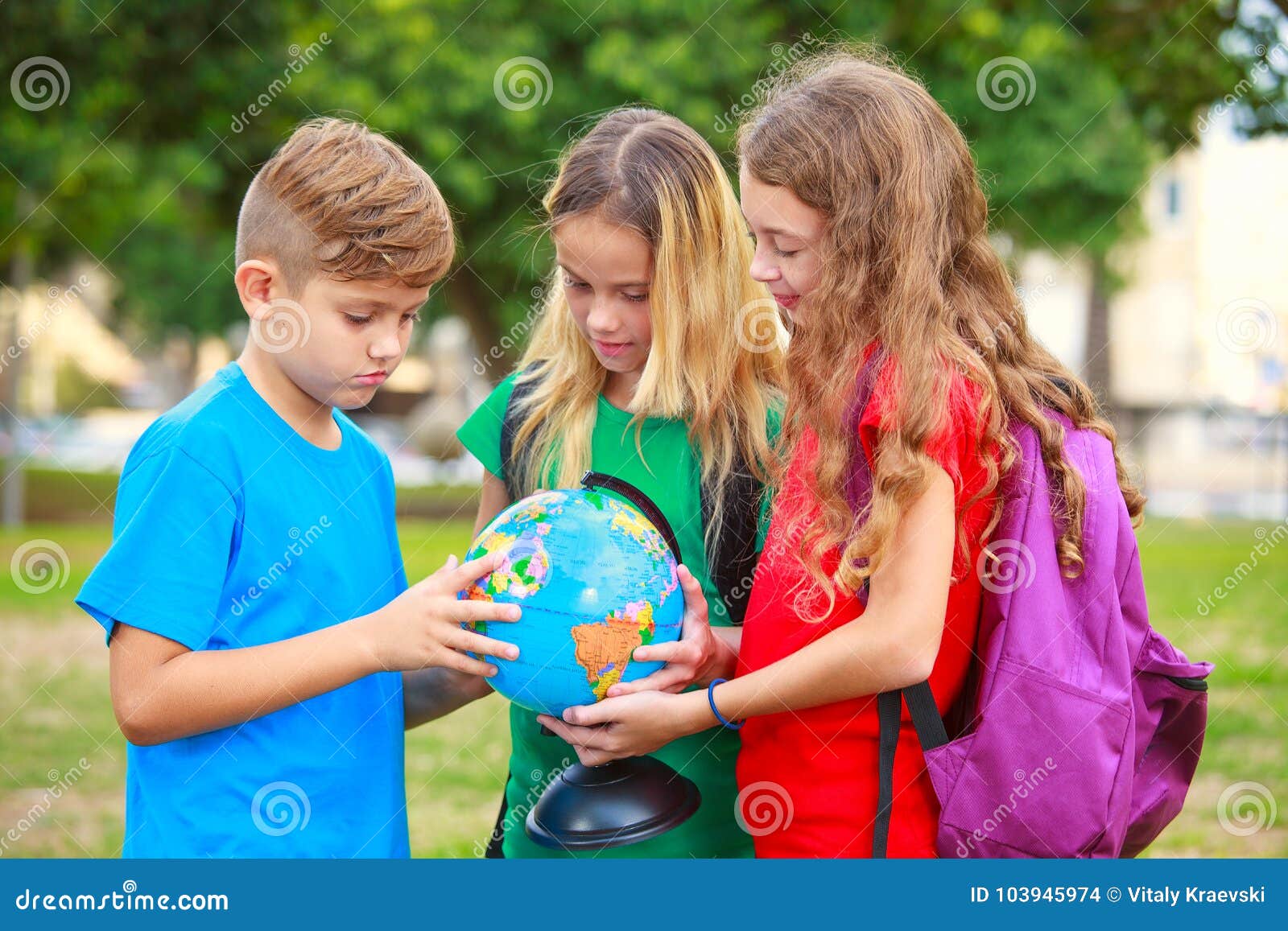 Children with a Globe are Learning Geography Stock Photo - Image of ...