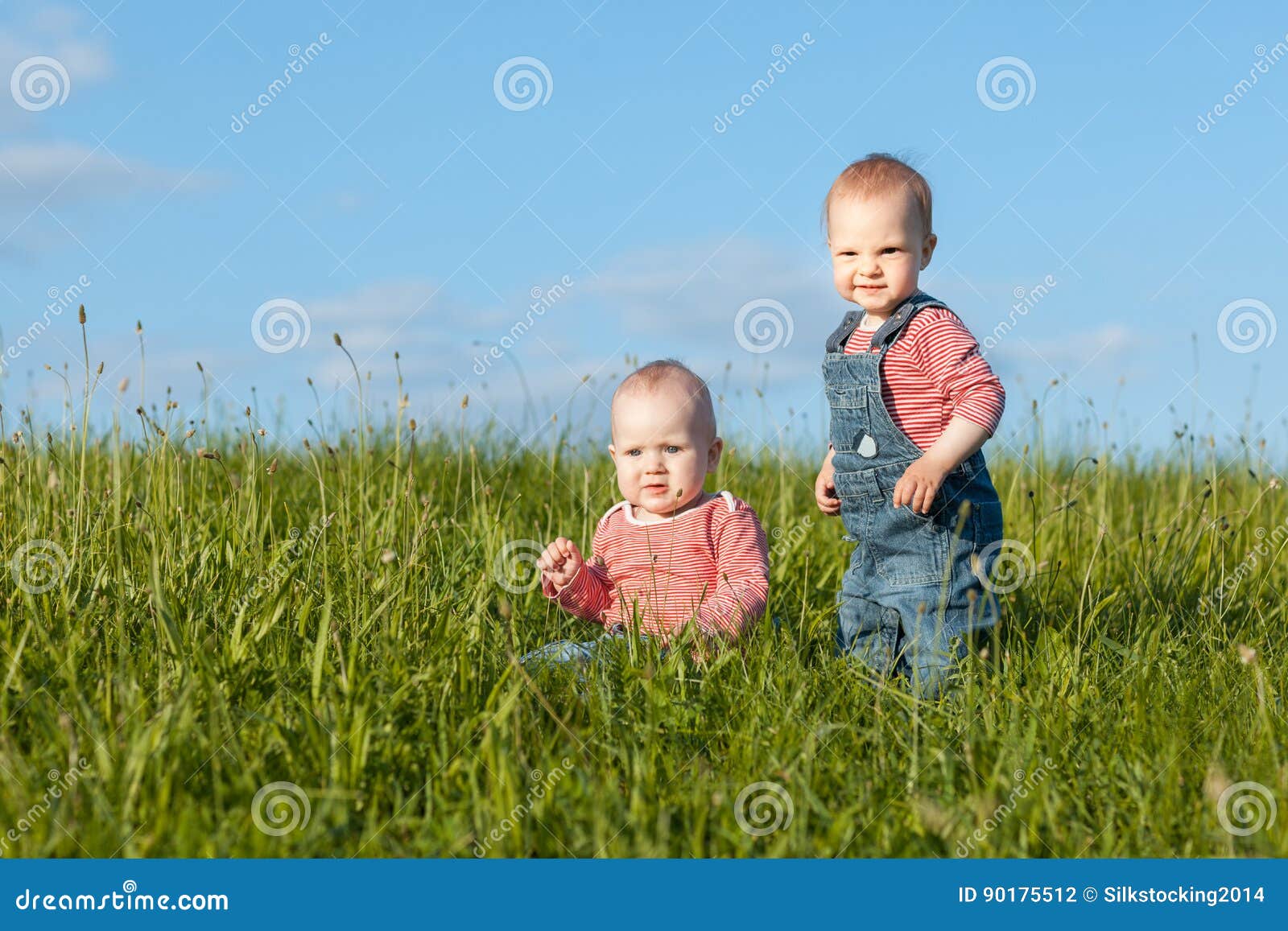 Children in the grass stock photo. Image of clouds, happiness - 90175512
