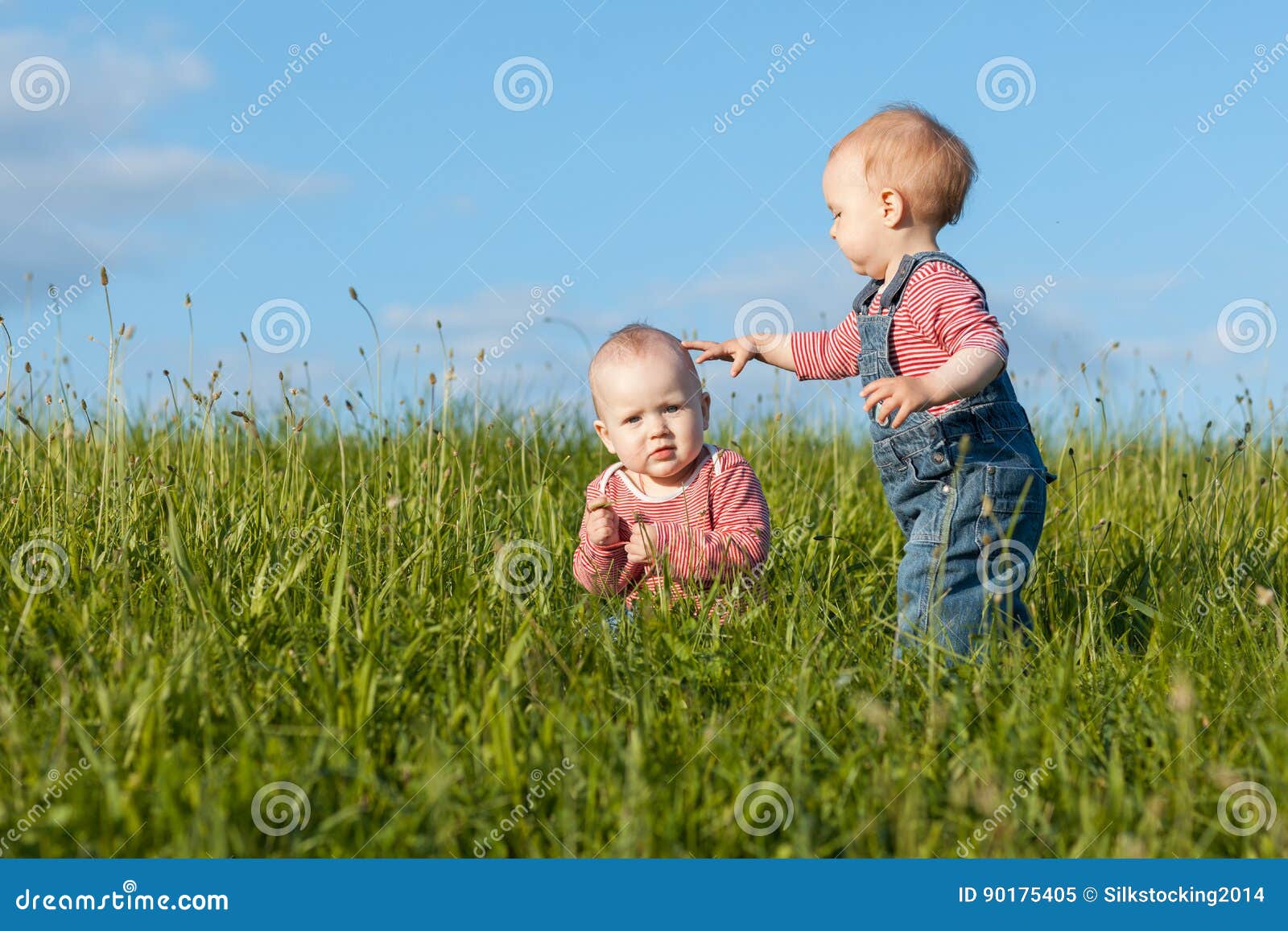 Children in green grass stock image. Image of sweet, people - 90175405