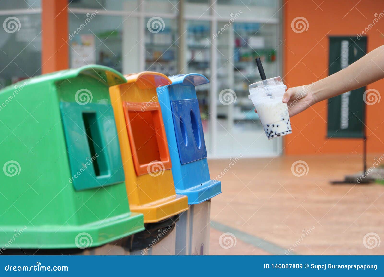 Children Hand Throwing Empty Plastic Bottle into the Trash.saving ...