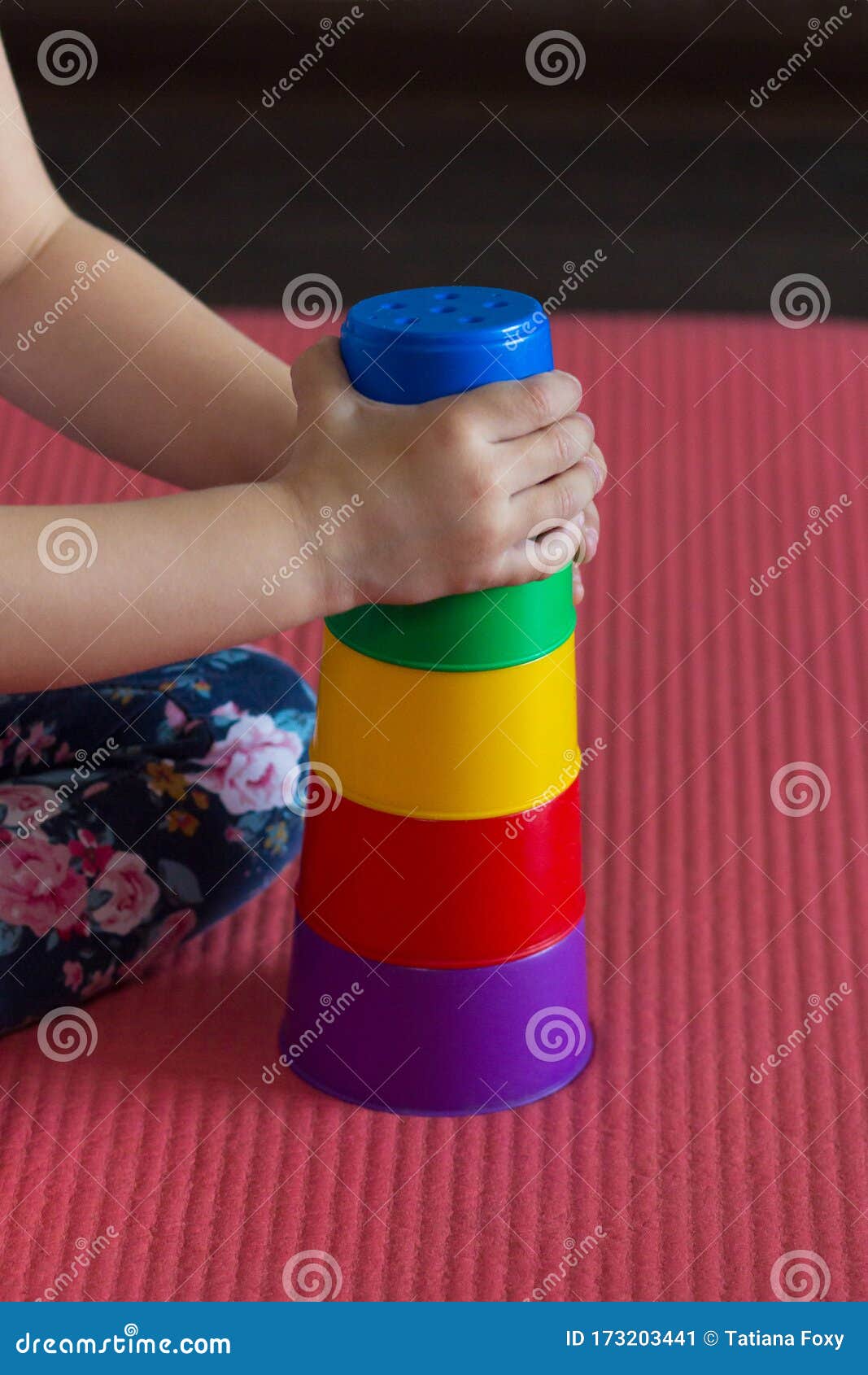 Children Hands Make Pyramid Using Colorful Stacking Cups Stock Image ...