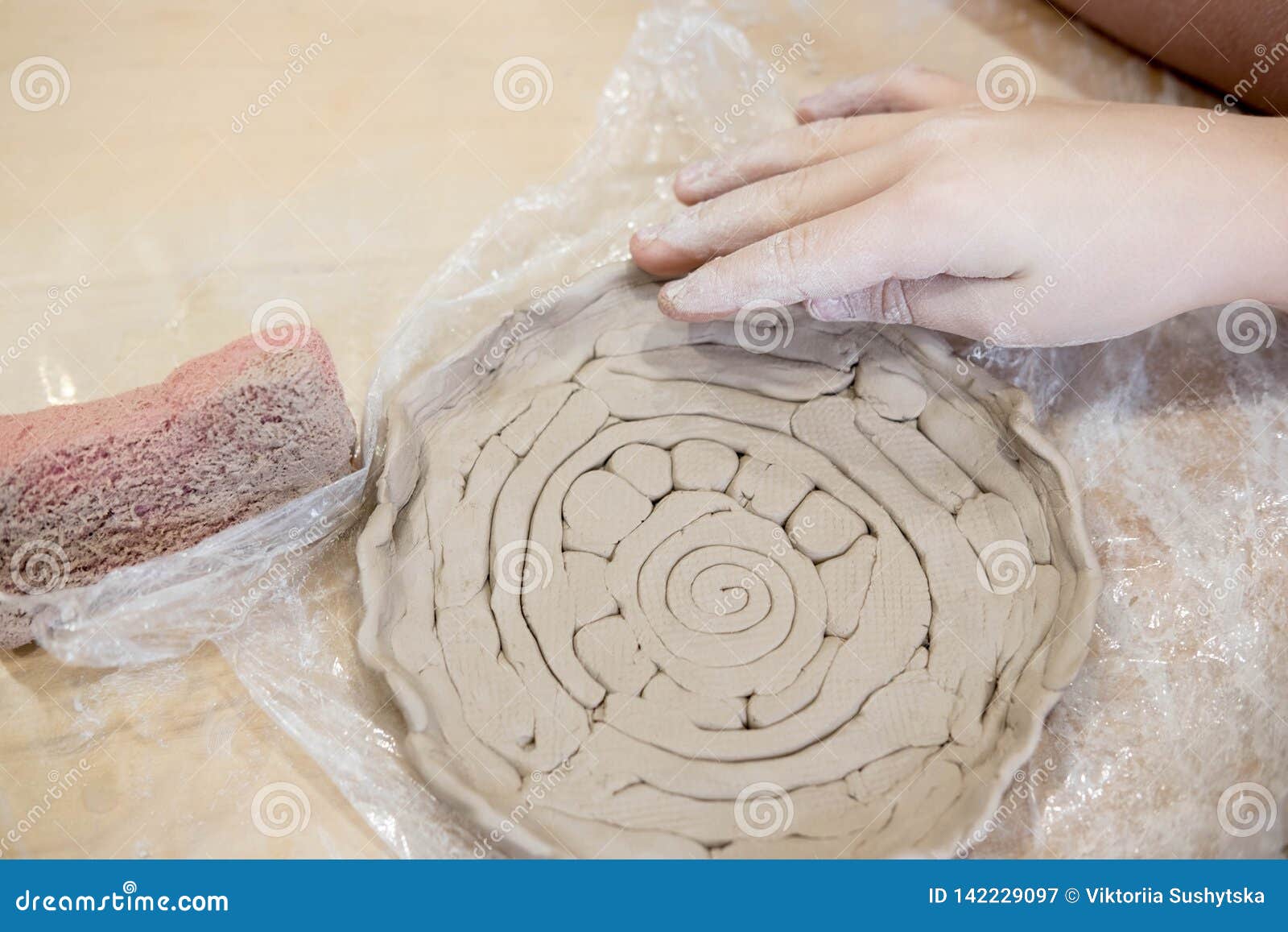 Children Hands that Mold from Clay. Children Creativity. Crafts from ...