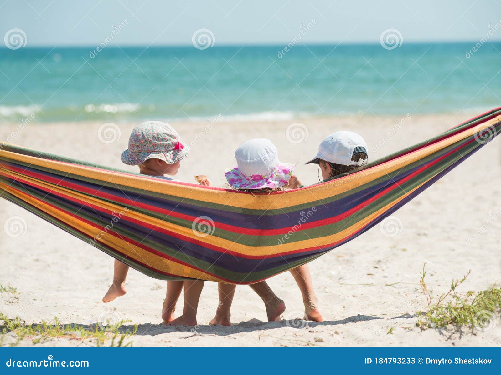 Children Have a Rest in a Hammock on a Sandy Seashore Stock Image ...