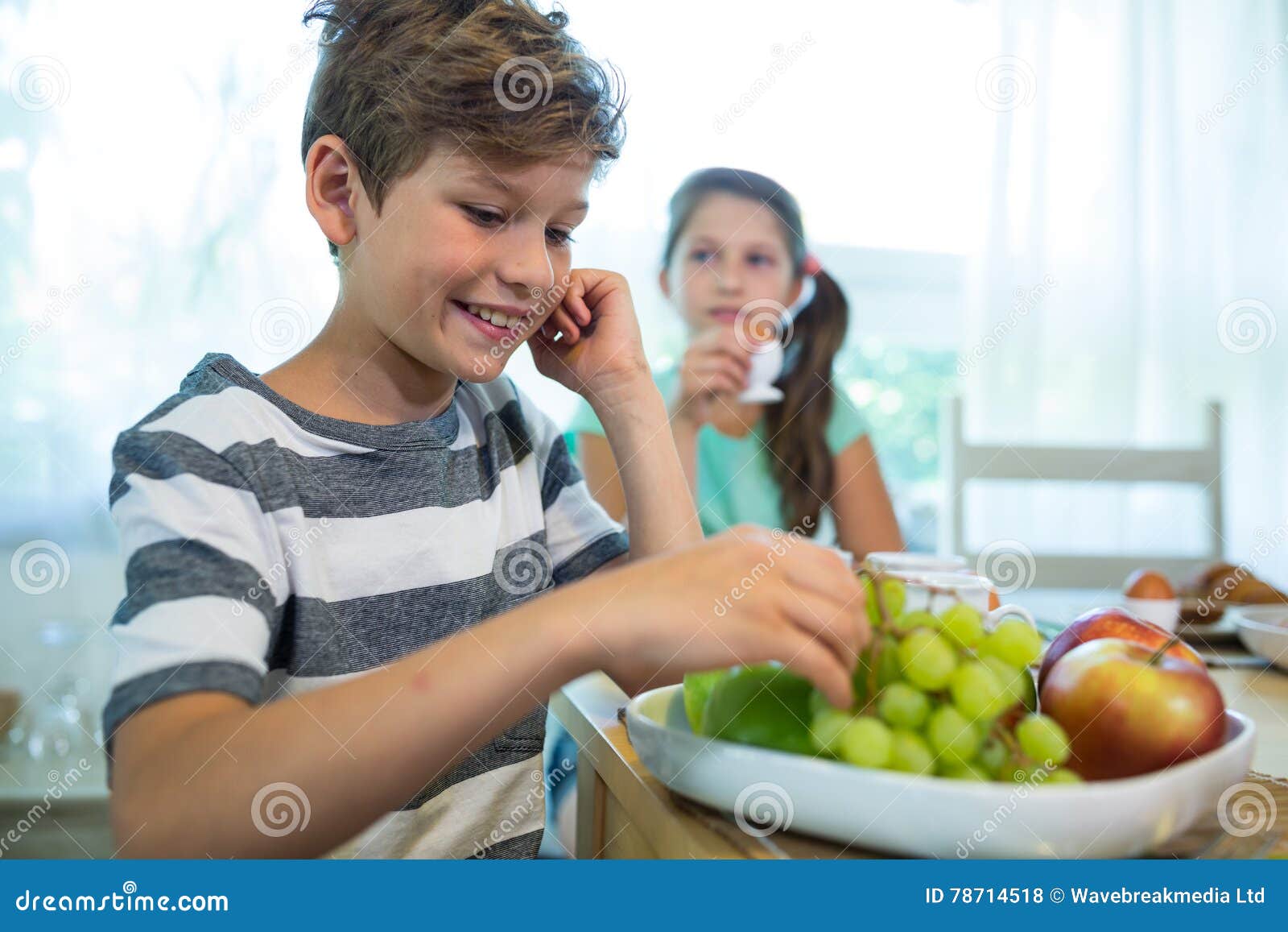 Children having breakfast stock photo. Image of children - 78714518