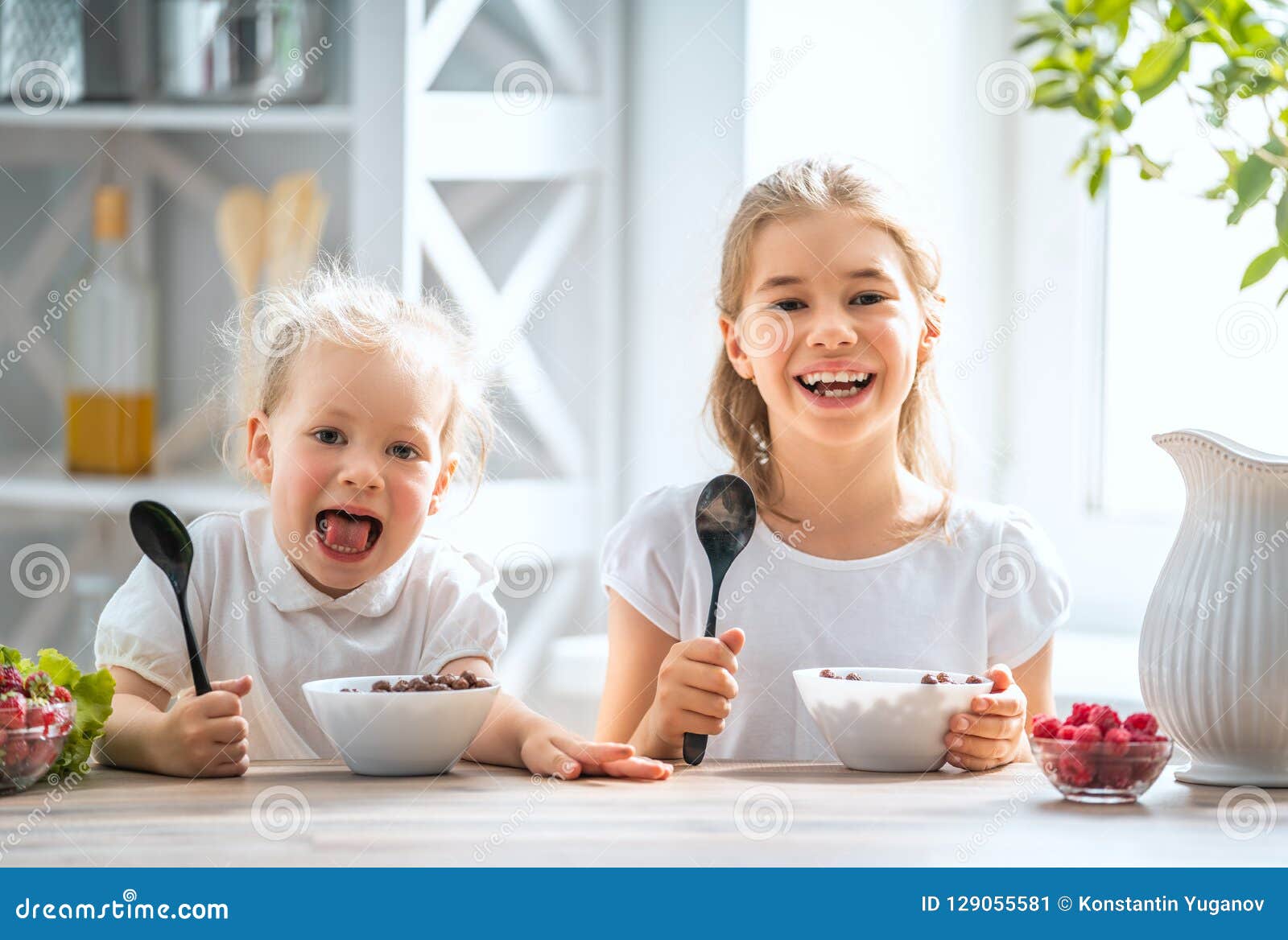 Children having breakfast stock image. Image of breakfast - 129055581