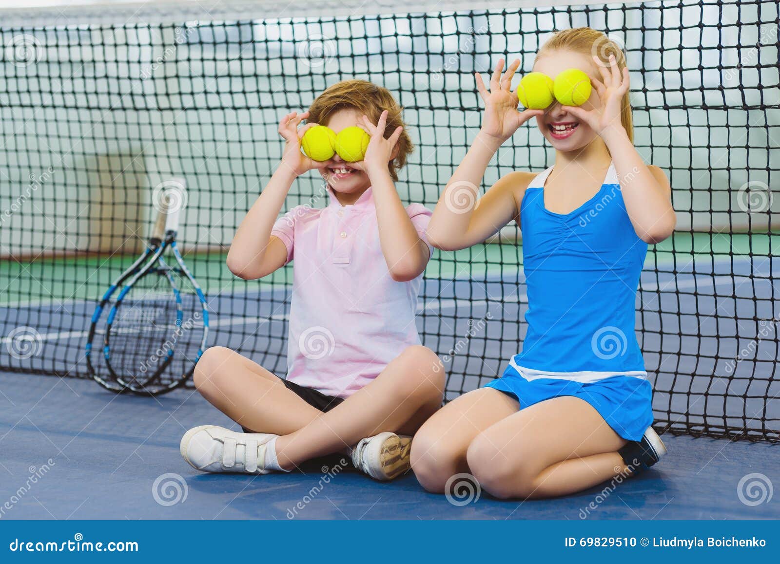 Children Having Fun and Playing on the Tennis Court Stock Photo - Image ...