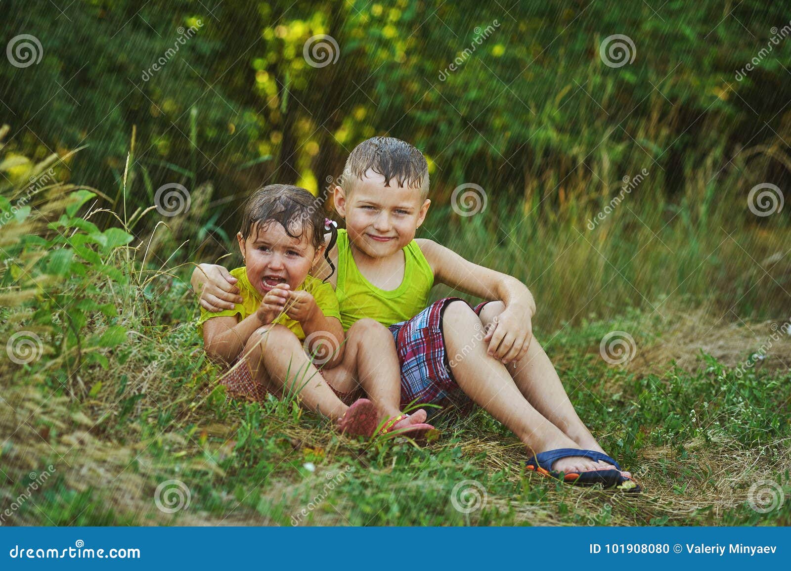 The Children are Having Fun Under the Summer Rain Stock Photo - Image ...