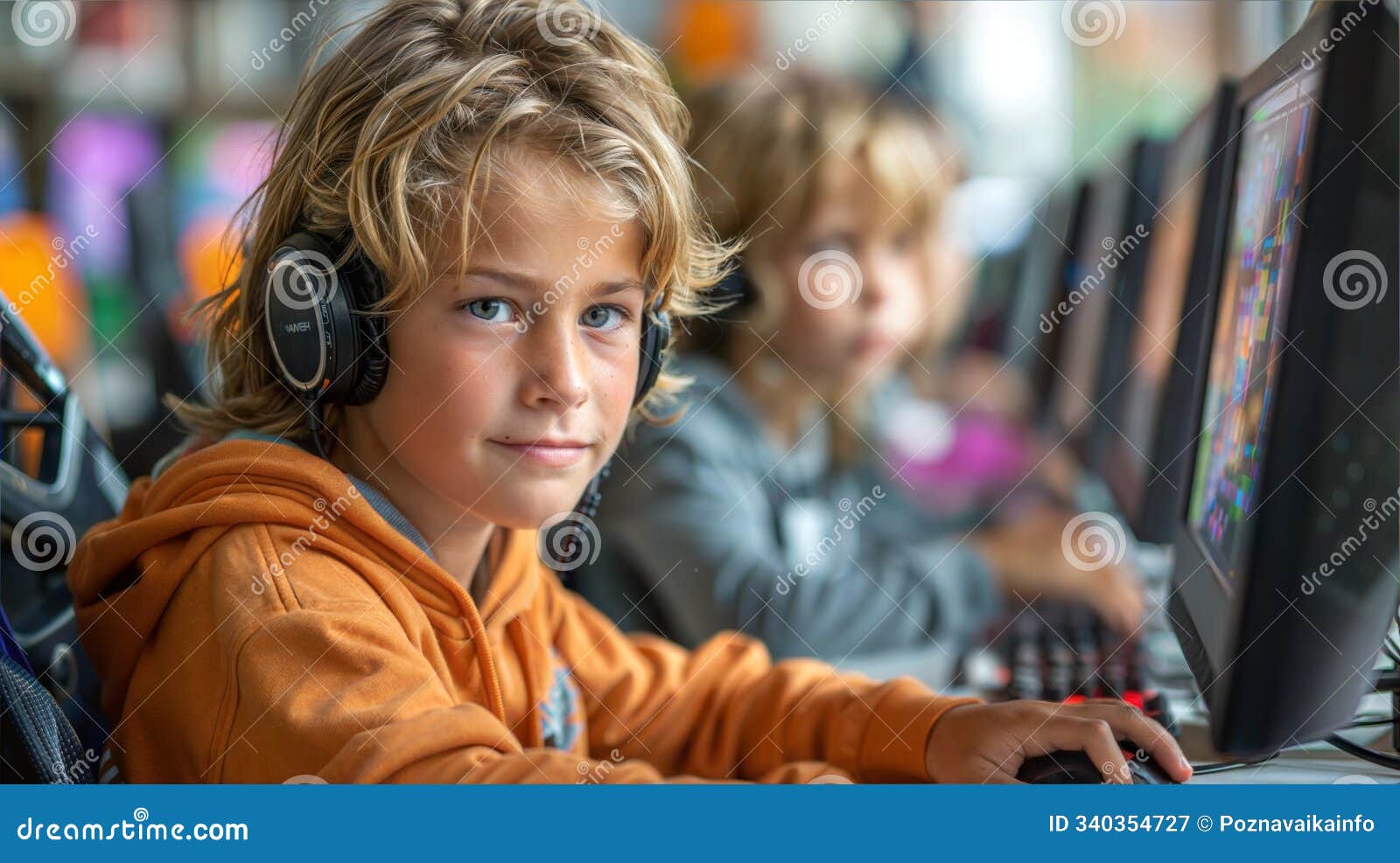 Children with Headphones Using Computers in a Classroom.. Stock Image ...