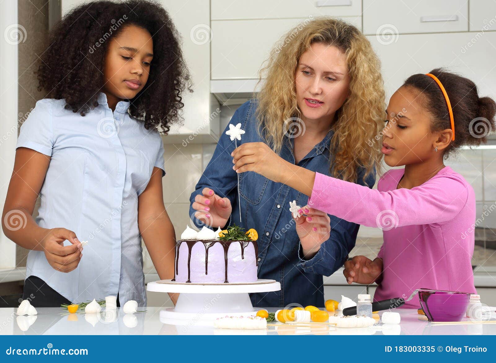 Children Help Mom Decorate the Cake Stock Image - Image of bakehouse ...