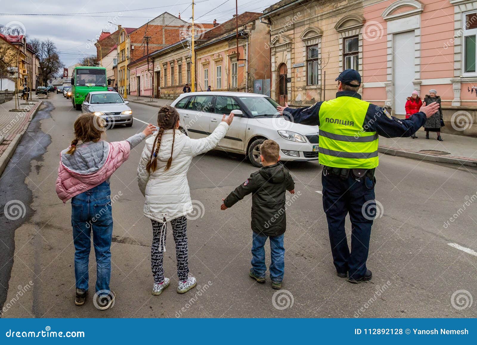 Children help a policeman editorial stock photo. Image of person ...