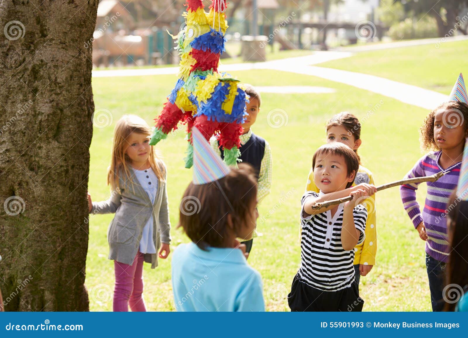 Children Hitting Pinata at Birthday Party Stock Image - Image of ...