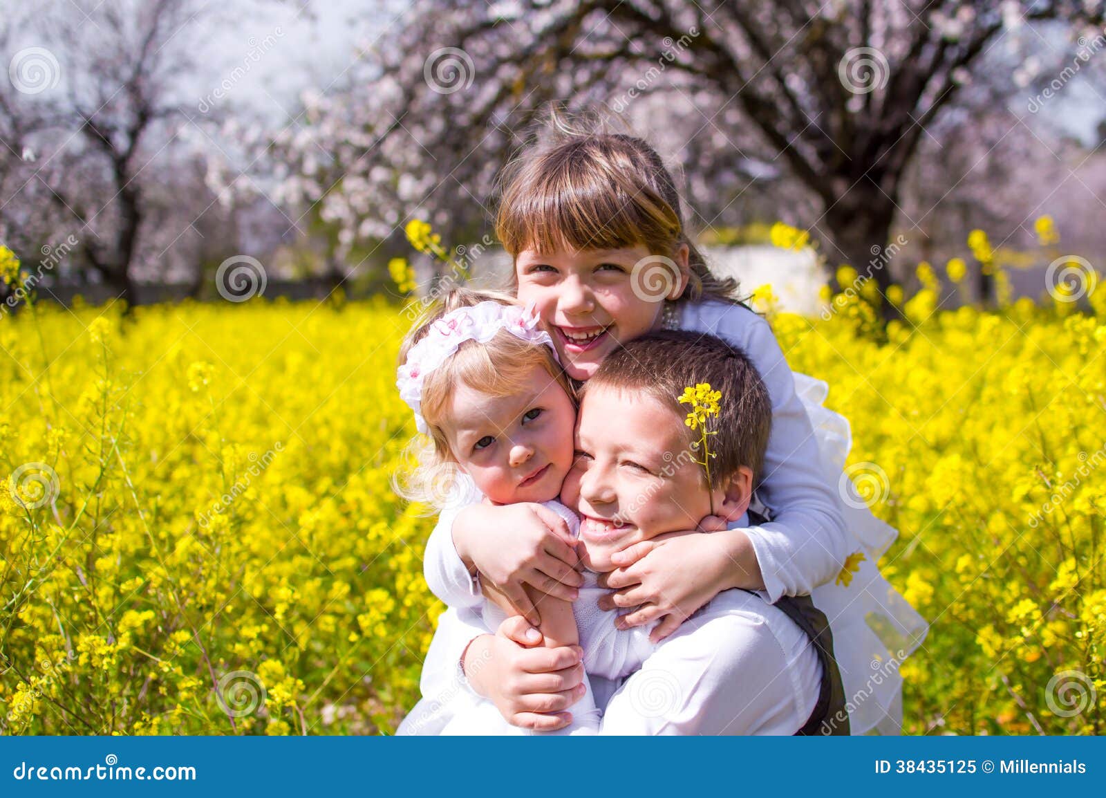Children hugging stock image. Image of spring, smiling - 38435125