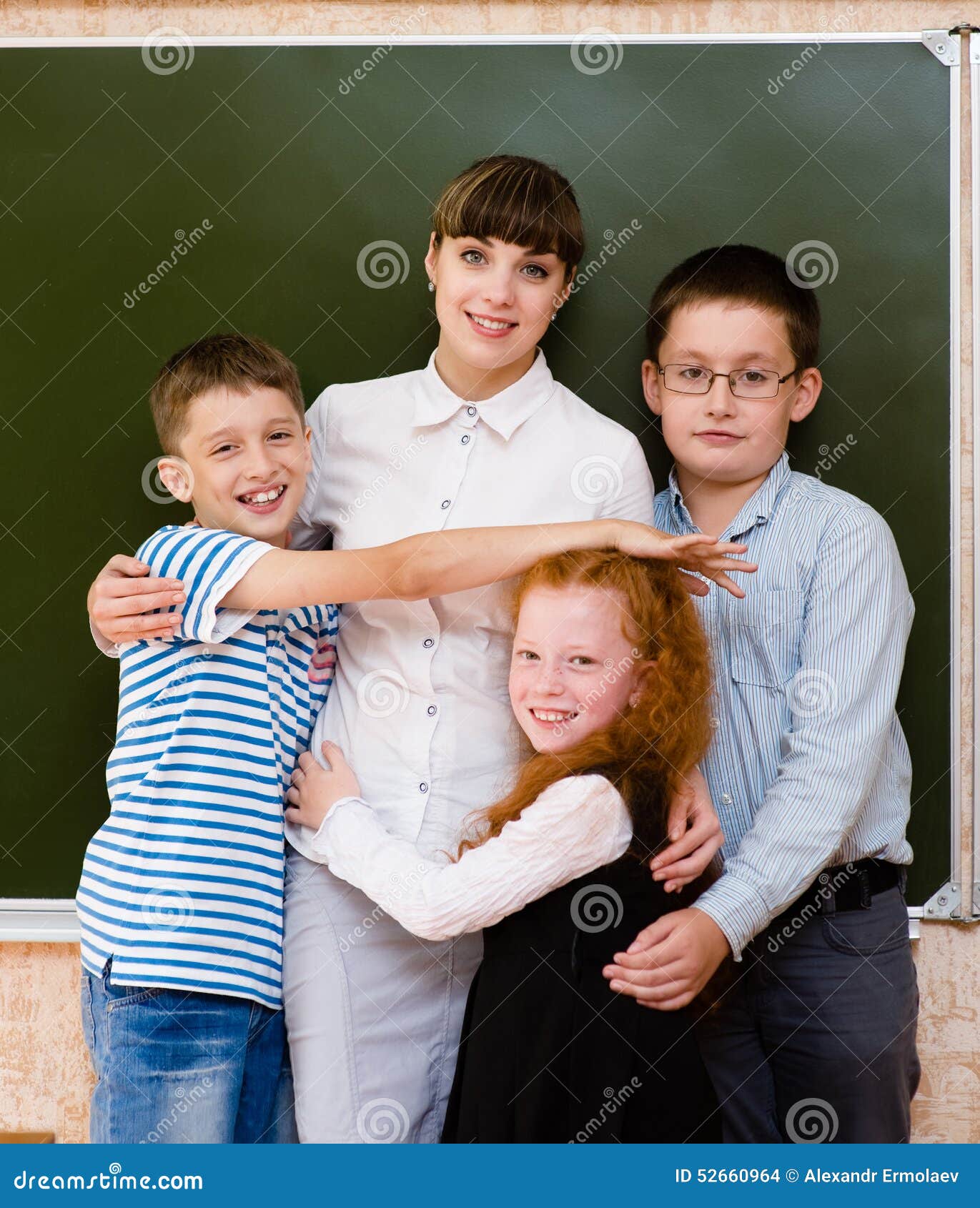 Children Hugging Their Teacher Stock Photo - Image of embrace, learner ...