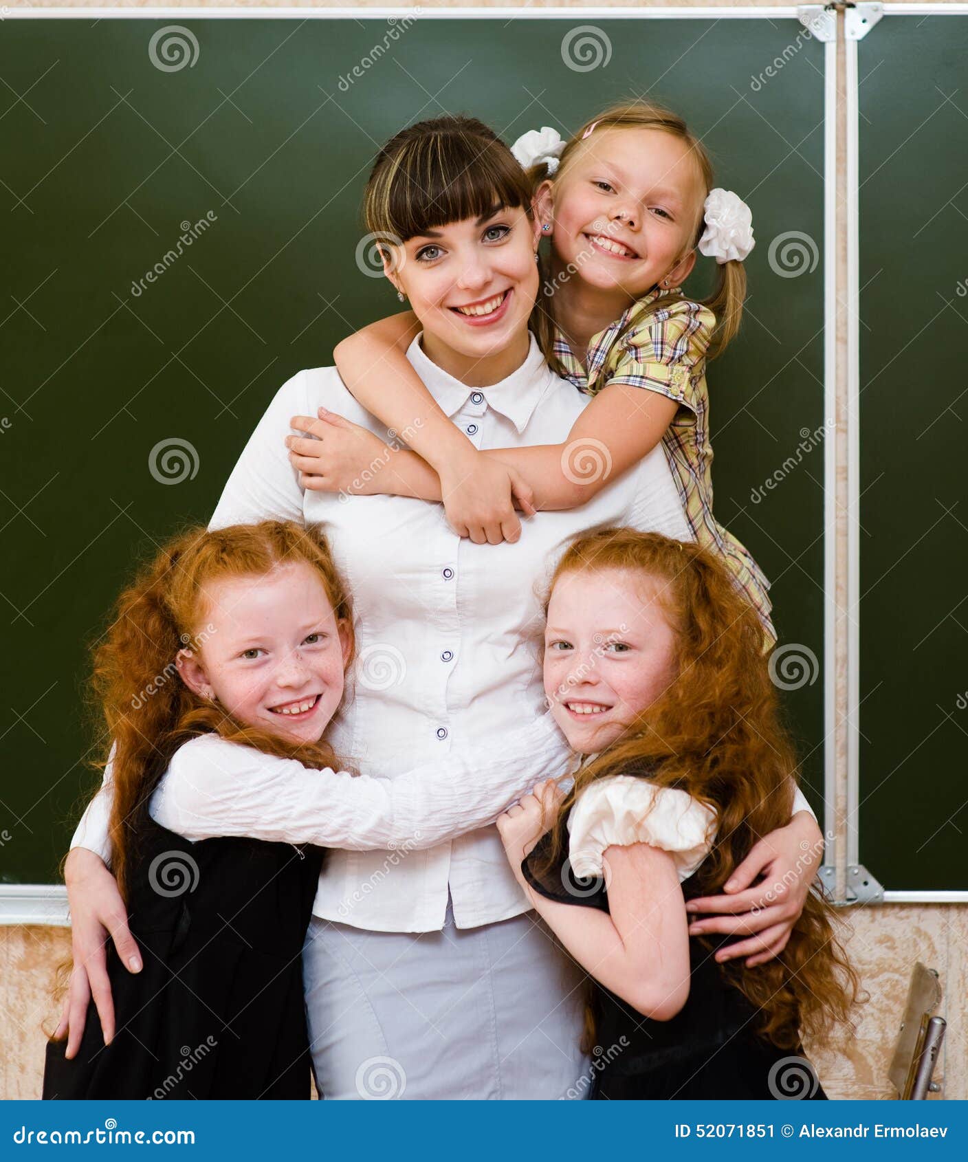 Children Hugging Their Teacher Stock Image - Image of desk, class: 52071851