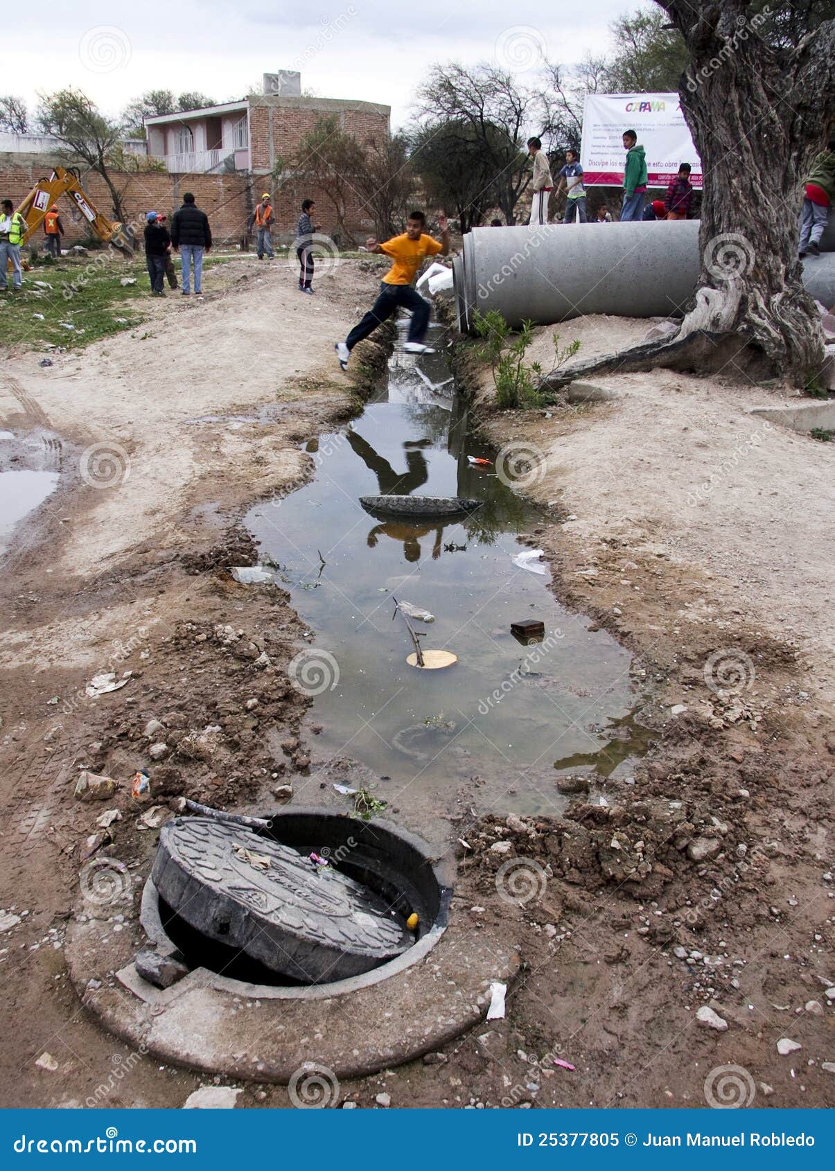 Children Jumping Over a Ditch by Sewage Editorial Image - Image of ...