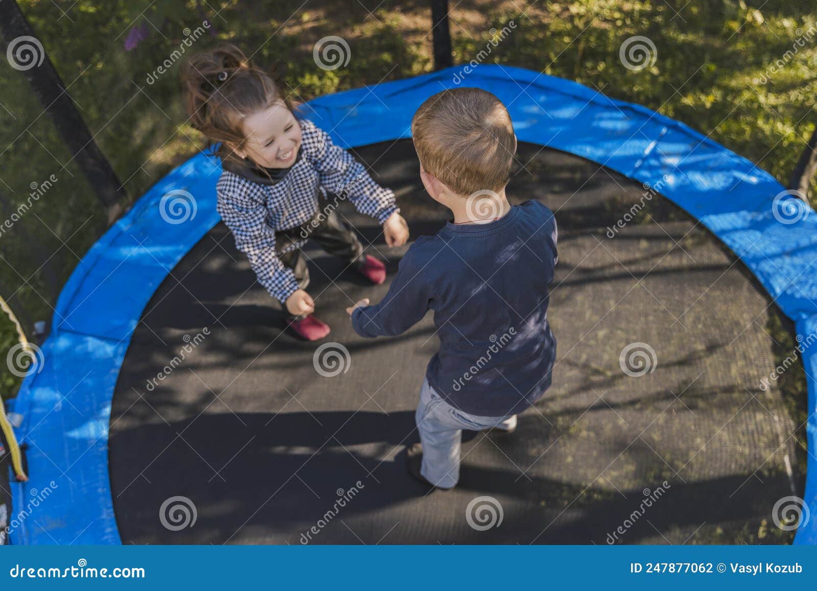 Children Jump on the Trampoline Stock Photo - Image of healthy ...
