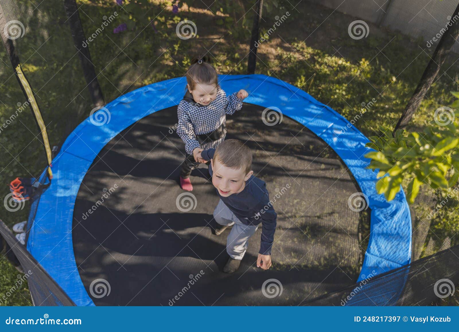 Children Jump on the Trampoline Stock Image - Image of mother, enjoy ...