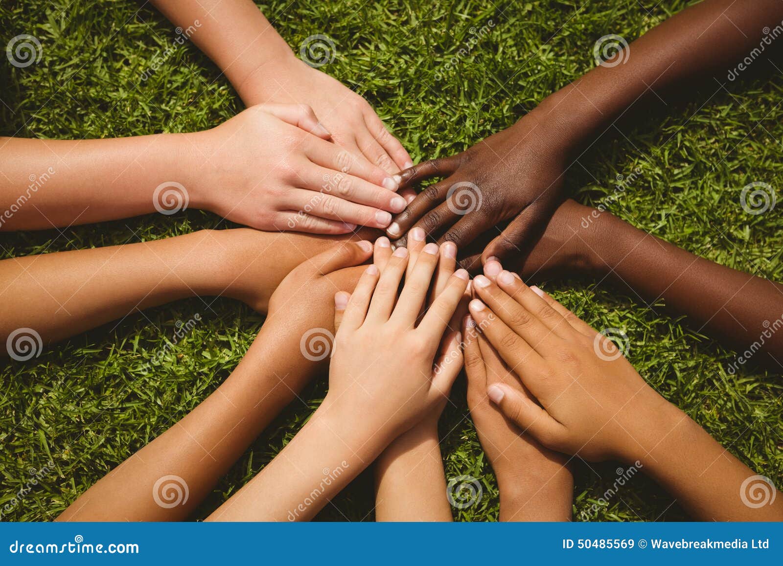 Children Keeping Hands Together Over Grass Stock Image - Image of ...