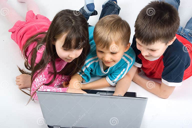 Children with a Laptop Computer Stock Photo - Image of contentment ...
