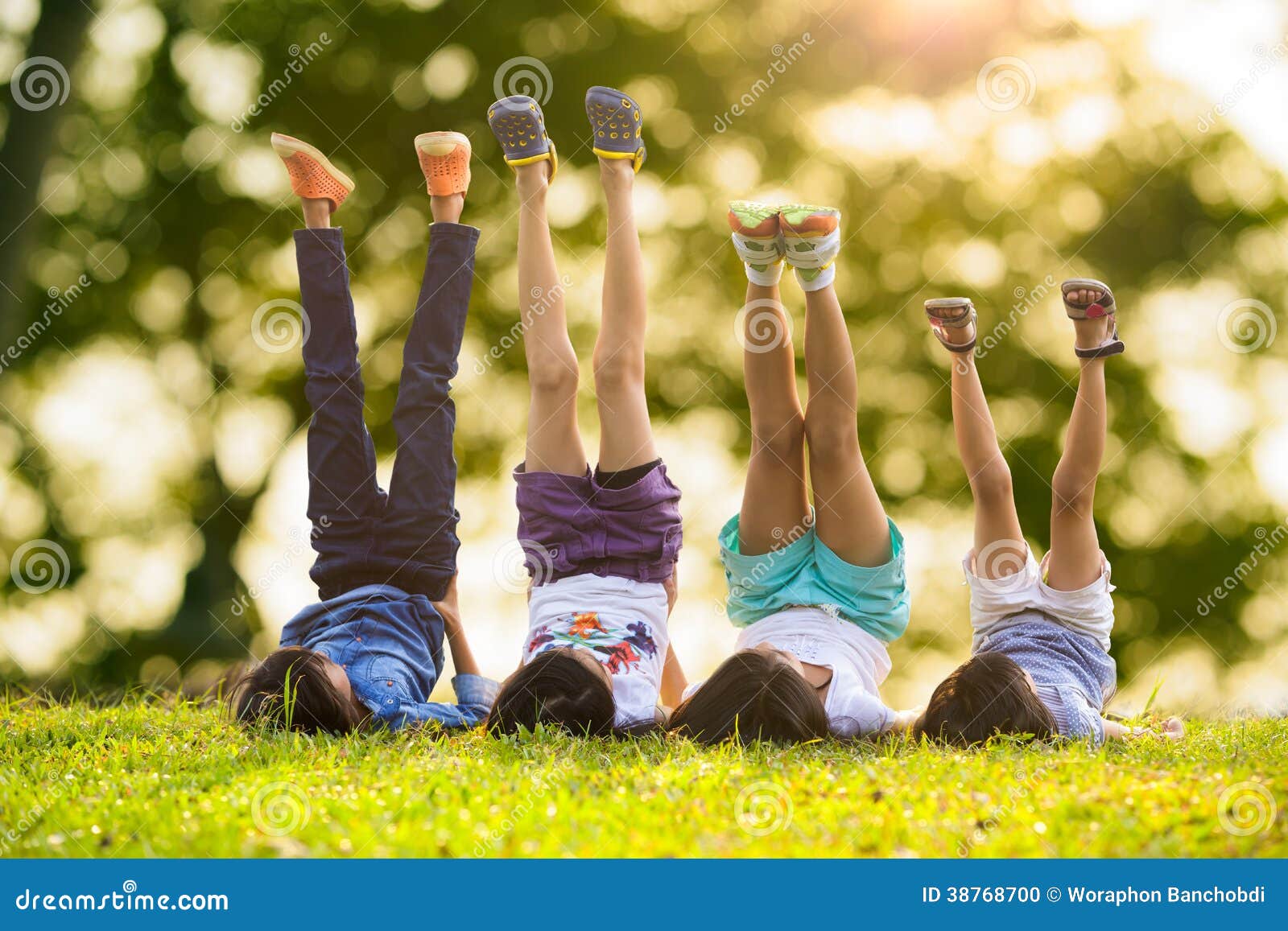 Children laying on grass stock photo. Image of boys, outdoors - 38768700