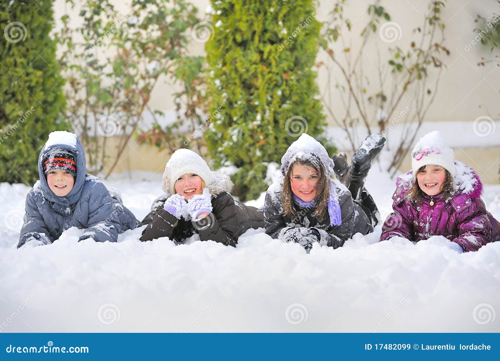 Children Laying on snow stock image. Image of old7, chilly - 17482099