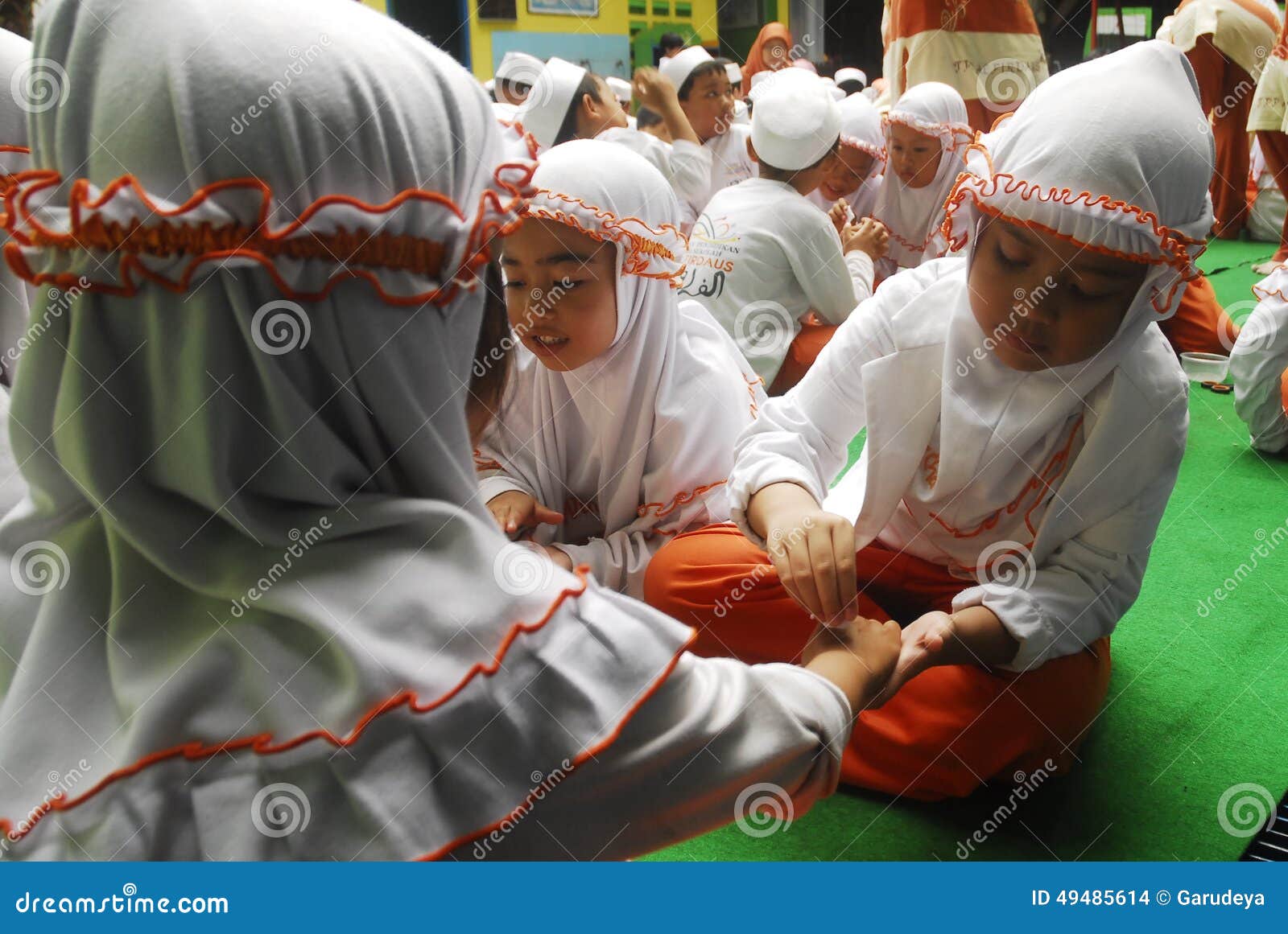 CHILDREN LEARN FIRST AID editorial stock image. Image of java - 49485614