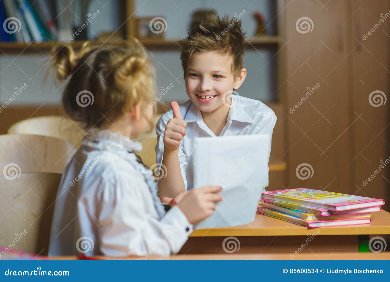 Children Learning and Doing Homework in School Classroom Stock Photo ...